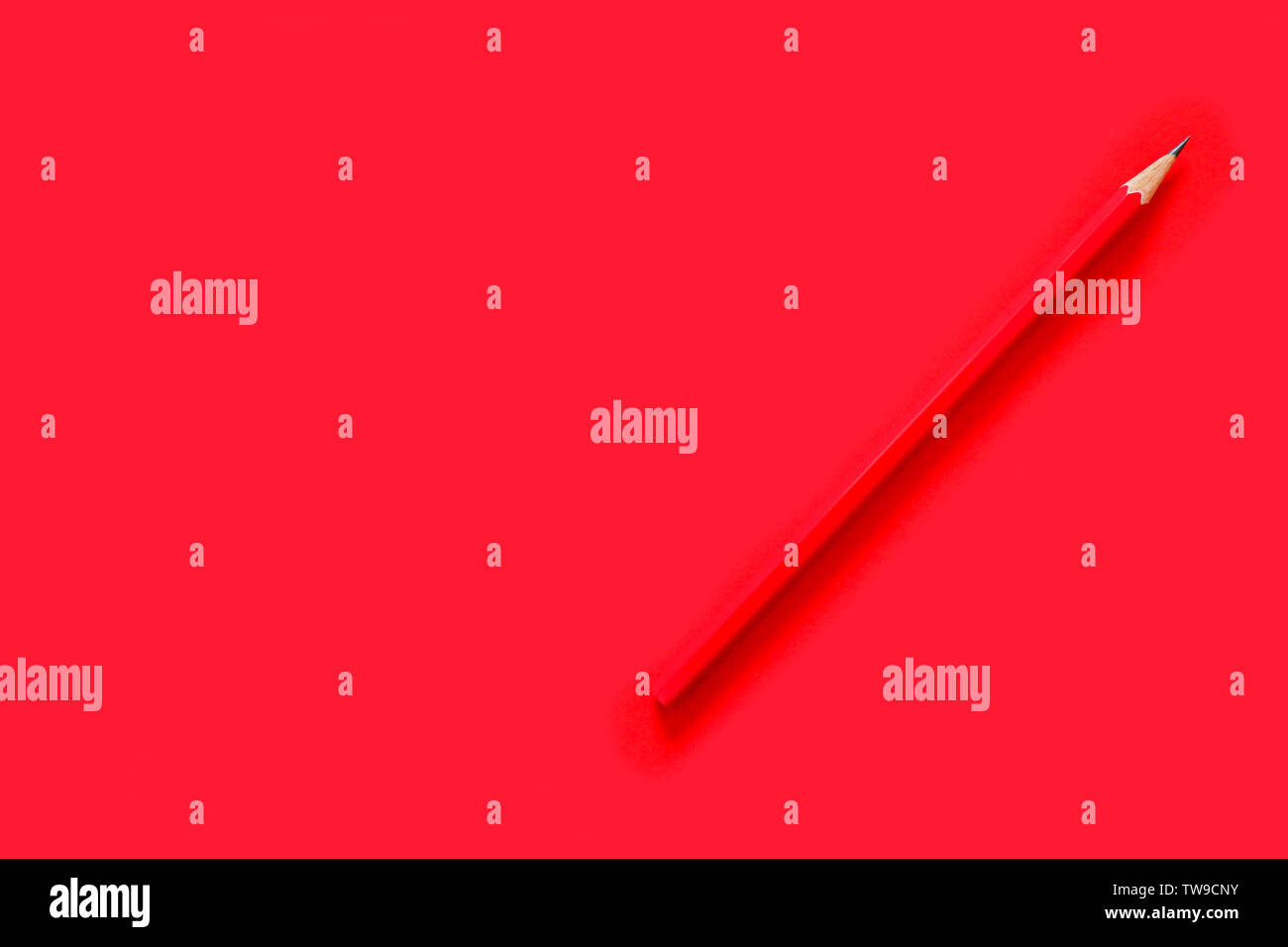 Close Up Wood Red Colored Pencil Single Object on Blank Red Paper ...