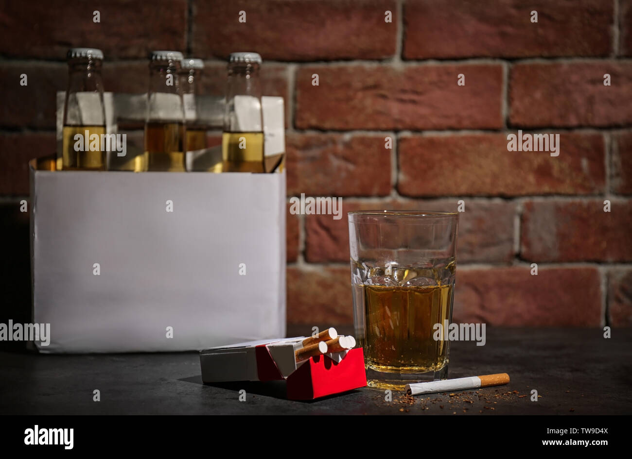 Beer bottles and cigarettes hi-res stock photography and images - Alamy