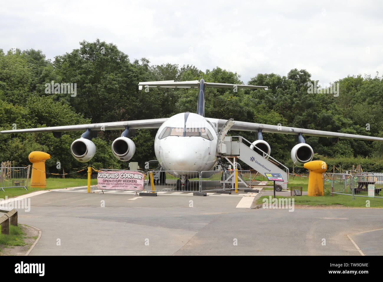 Families visiting Manchester airport's runway visitor park watching the ...