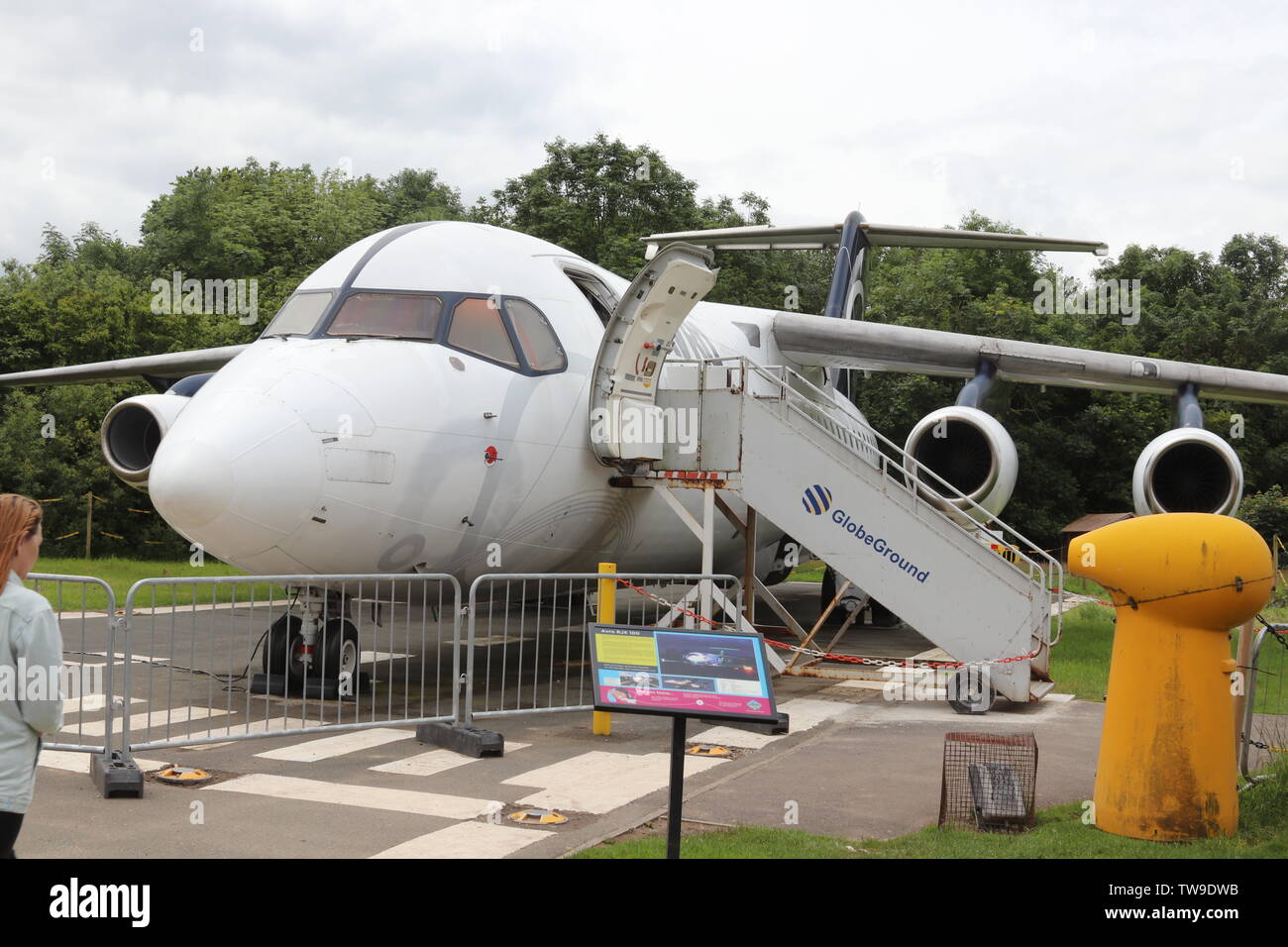 Families visiting Manchester airport's runway visitor park watching the ...