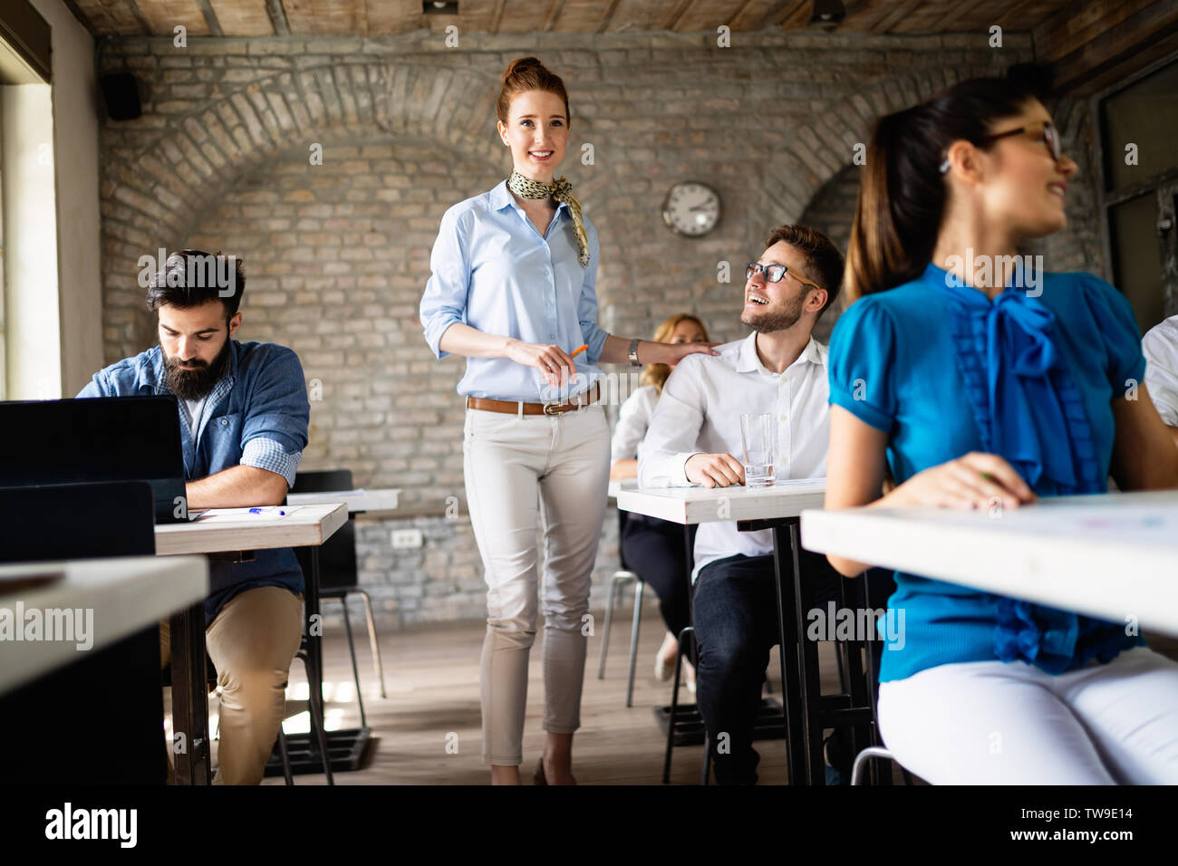 Happy creative team in office. Business, startup, design, people and ...