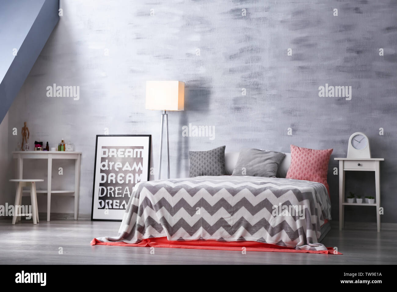 Cozy room interior with comfortable bed Stock Photo - Alamy