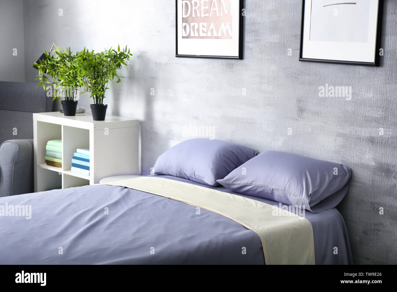 Cozy room interior with comfortable bed, closeup Stock Photo - Alamy