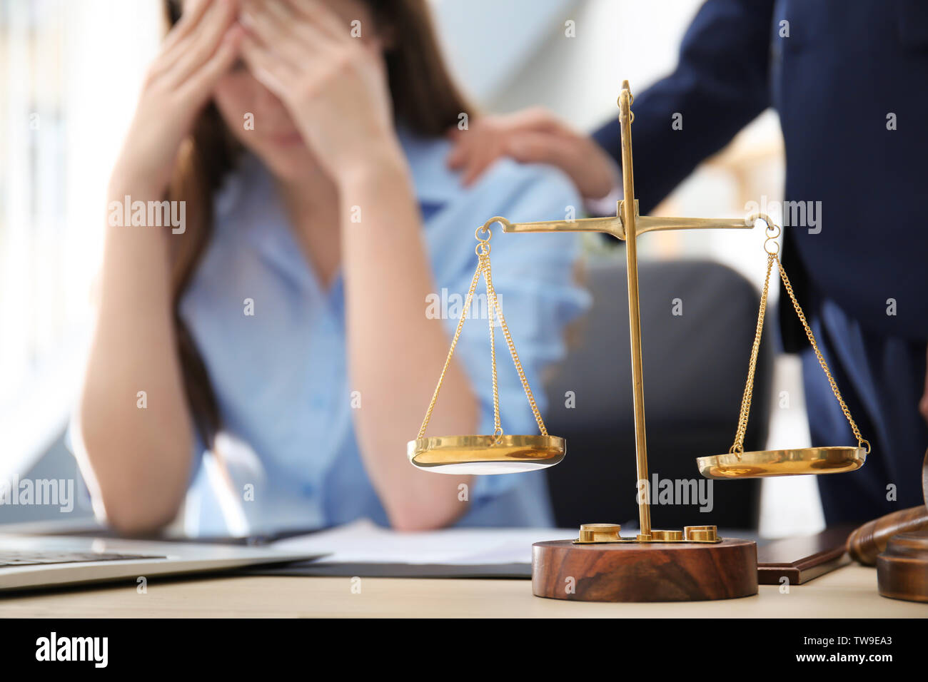 Scales of justice on table in lawyer's office Stock Photo - Alamy