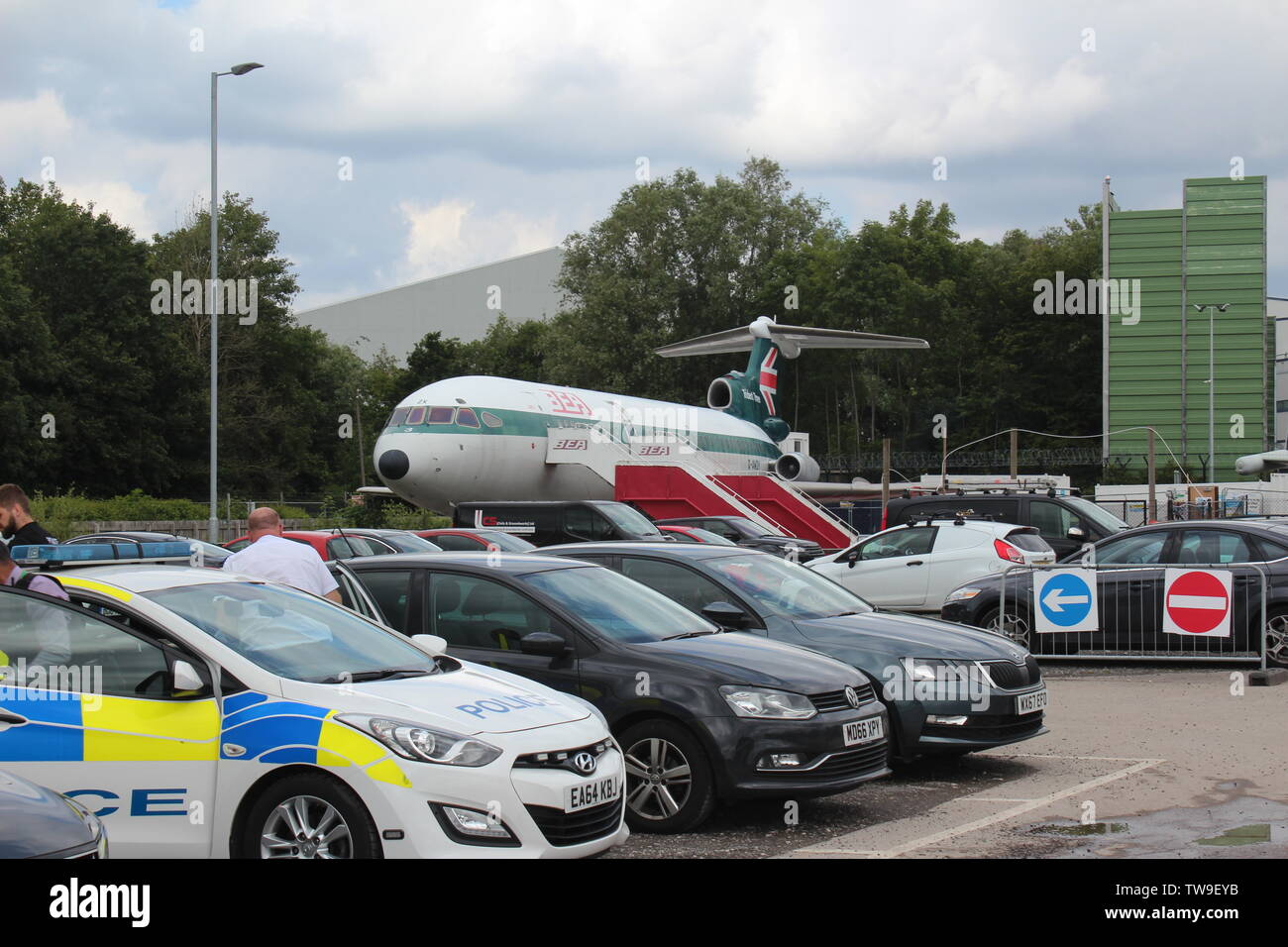 Families visiting Manchester airport's runway visitor park watching the ...