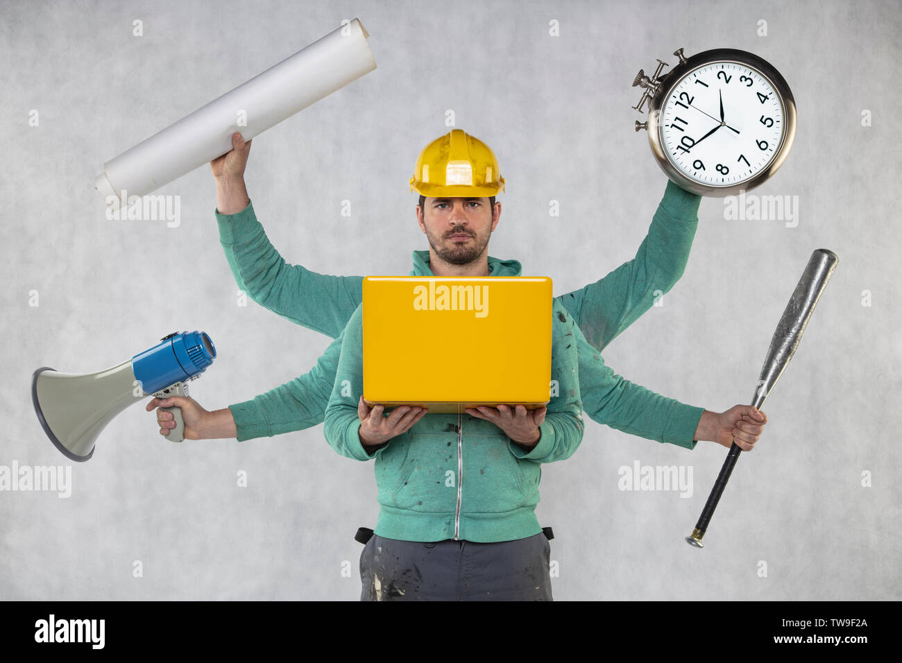 multitasking construction worker ready for any task Stock Photo - Alamy