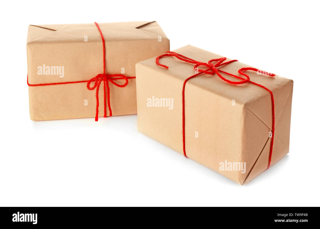 Two parcel gift boxes on white background Stock Photo - Alamy