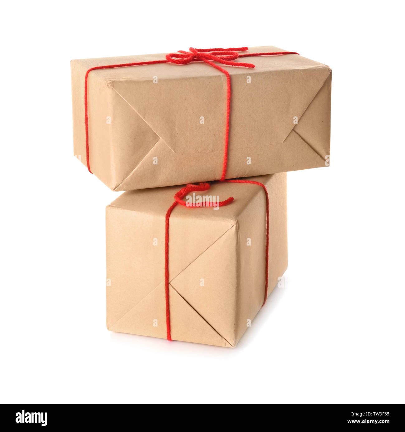 Two parcel gift boxes on white background Stock Photo - Alamy