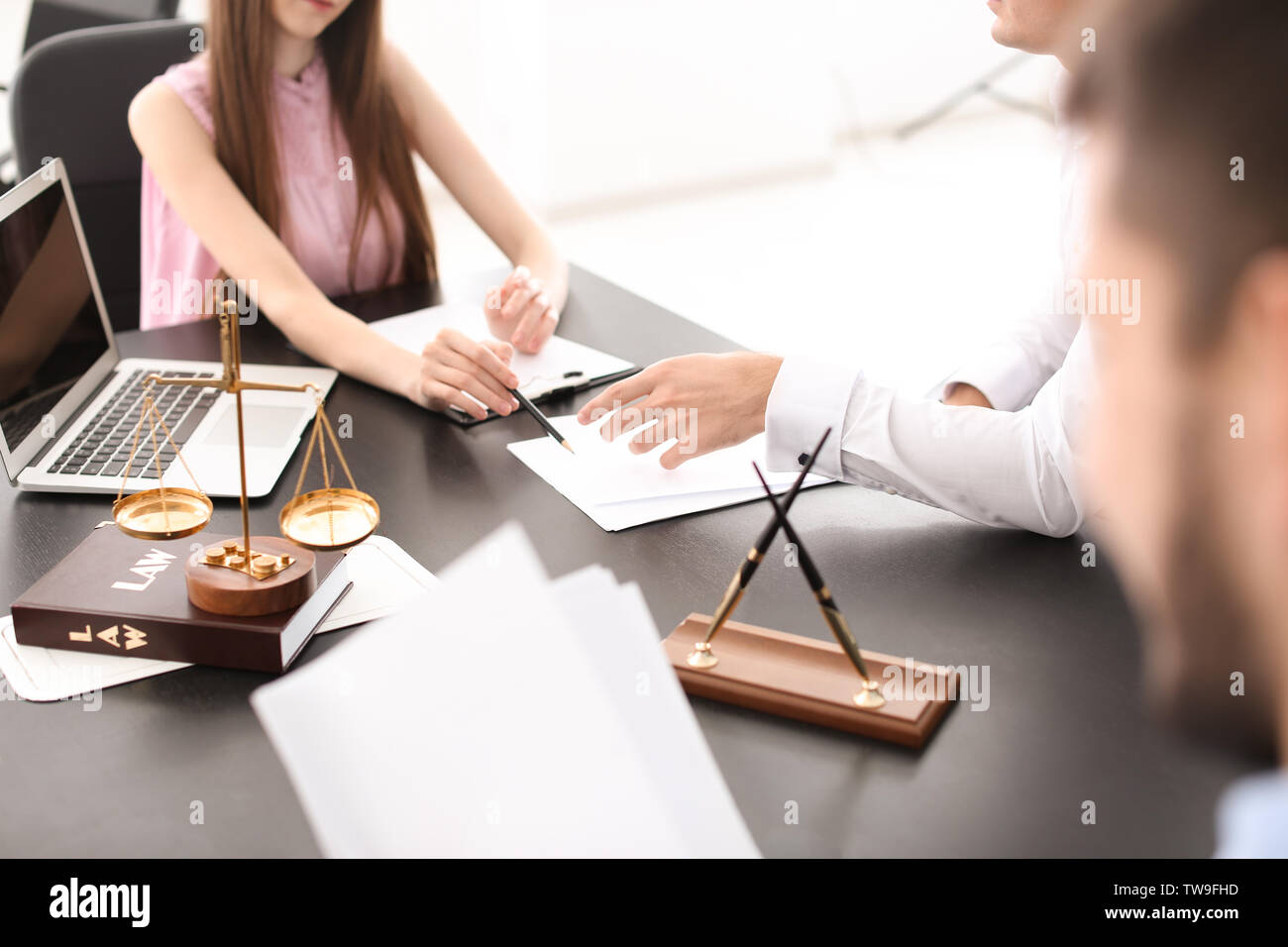Lawyer having meeting with client in office Stock Photo - Alamy
