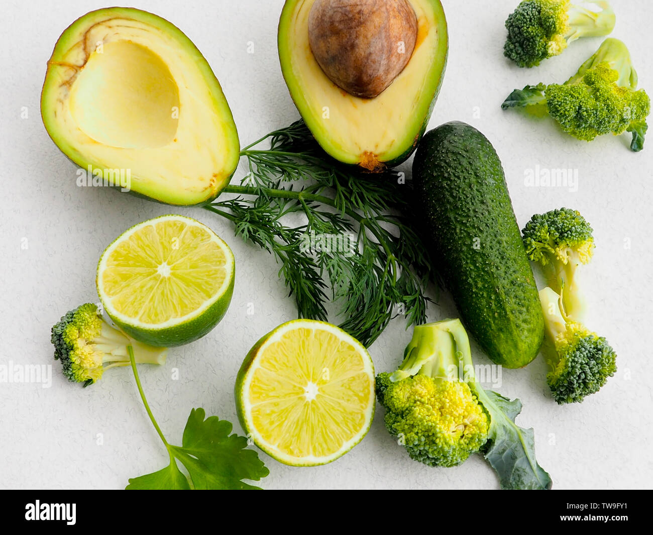 Flat lay series of assorted green toned vegetables, fresh organic raw ...