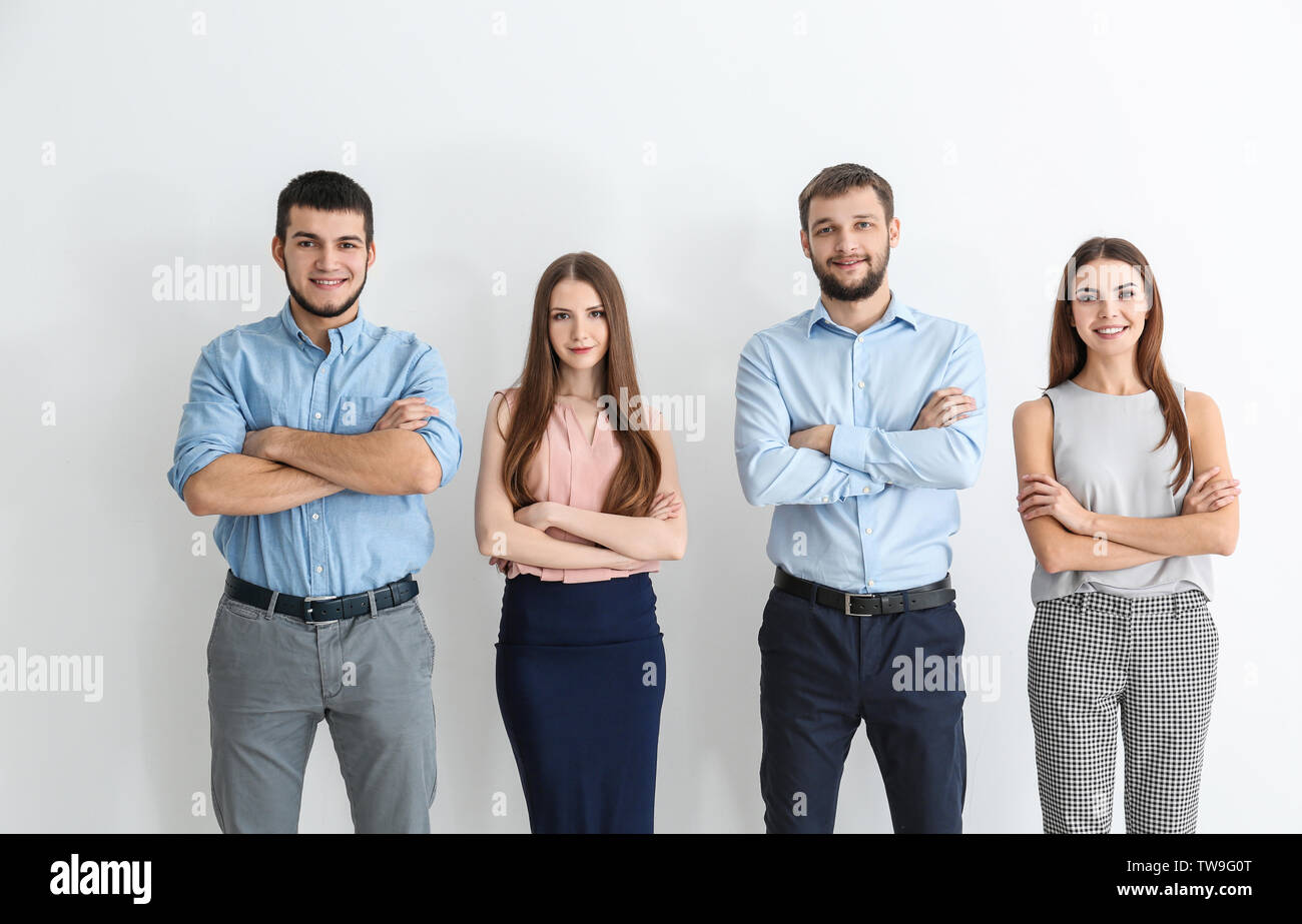 Young people standing together on white background. Unity concept Stock ...