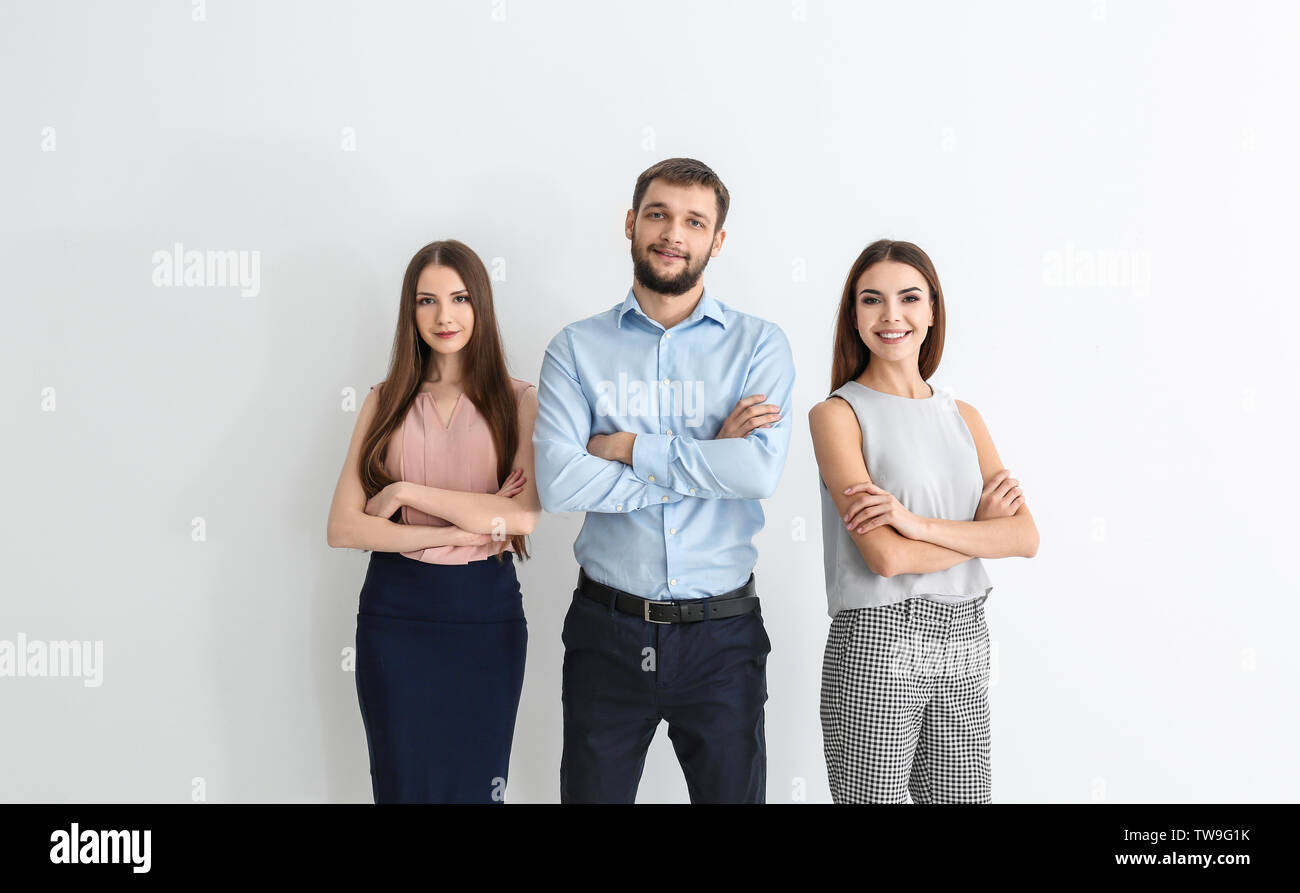 Young people standing together on white background. Unity concept Stock ...