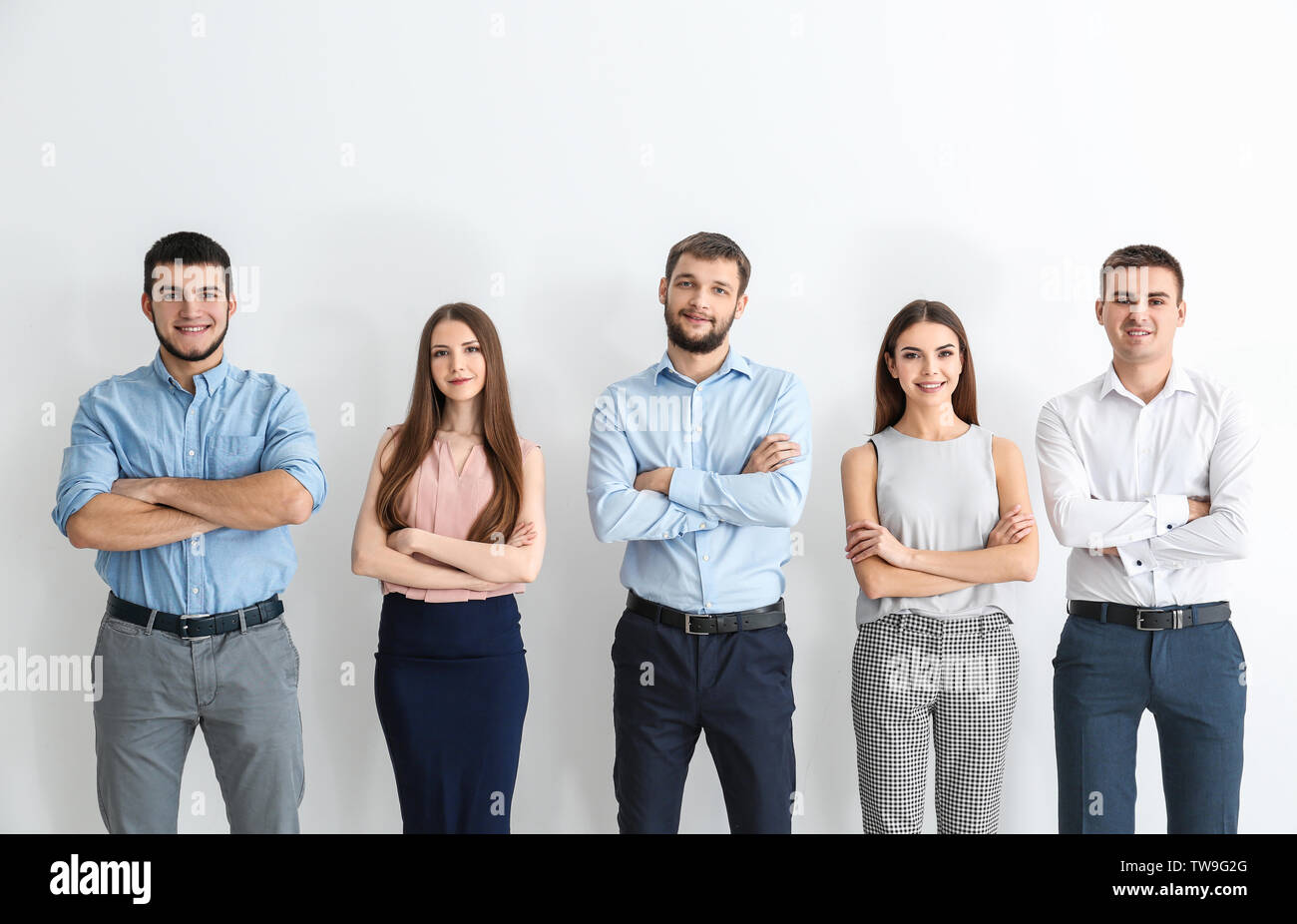 Young people standing together on white background. Unity concept Stock ...