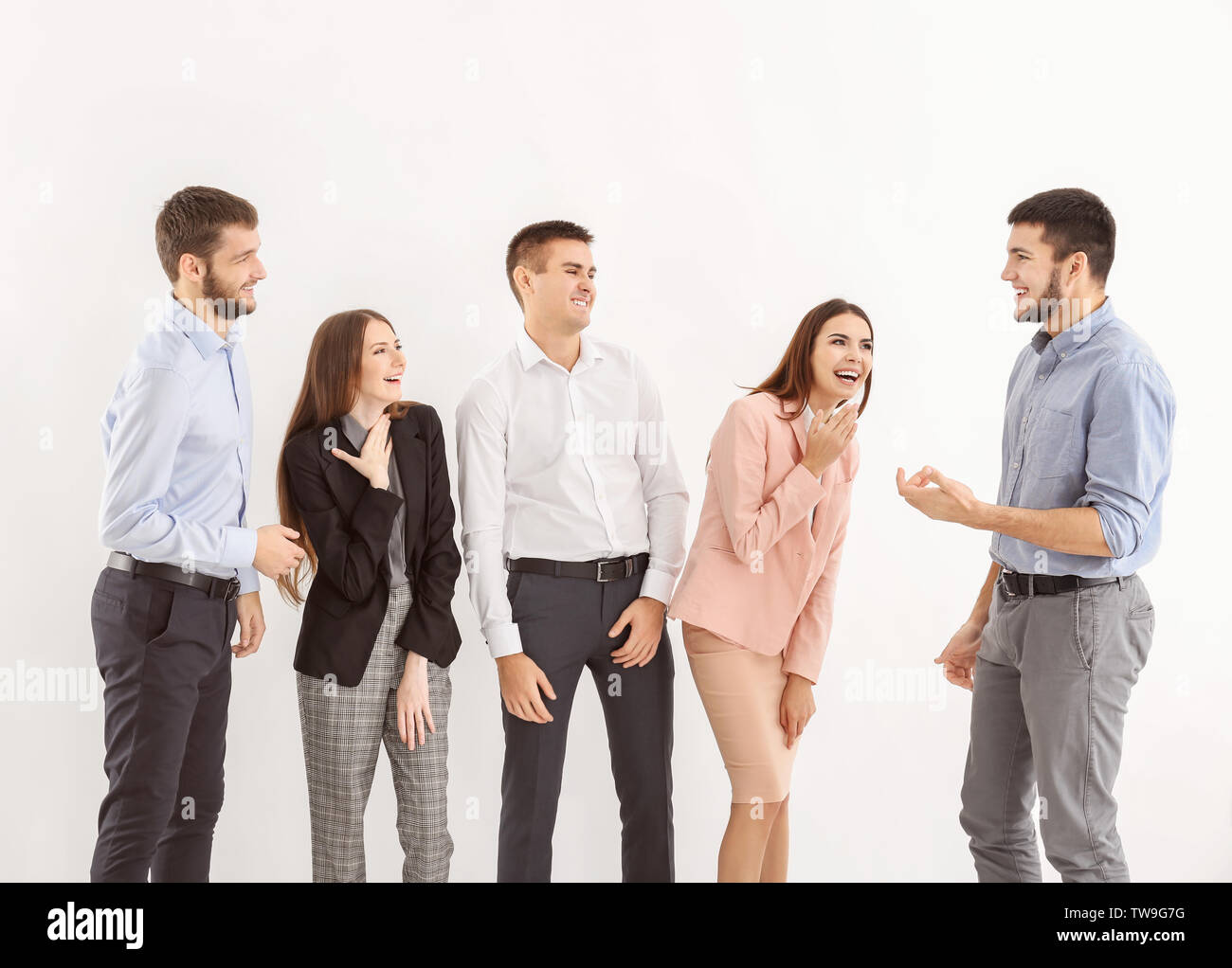 Young people against white wall. Unity concept Stock Photo - Alamy