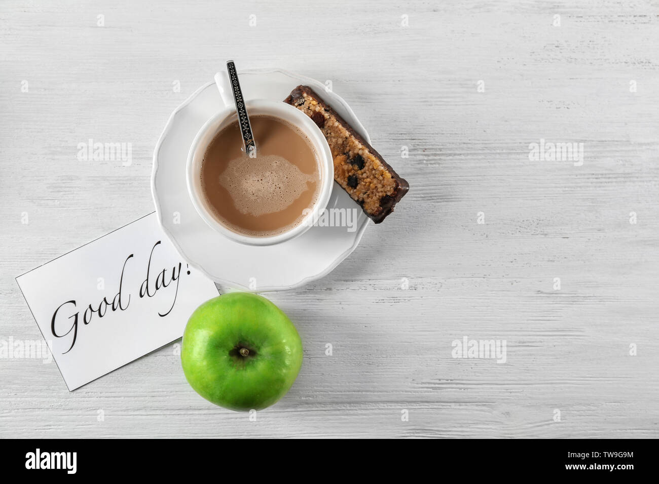 Composition with tasty breakfast and "Good day" wish on table, top view ...