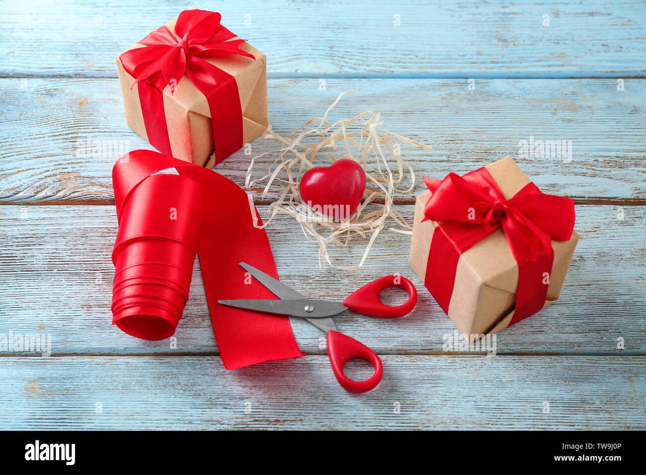 Composition with parcel gift boxes on wooden background Stock Photo - Alamy