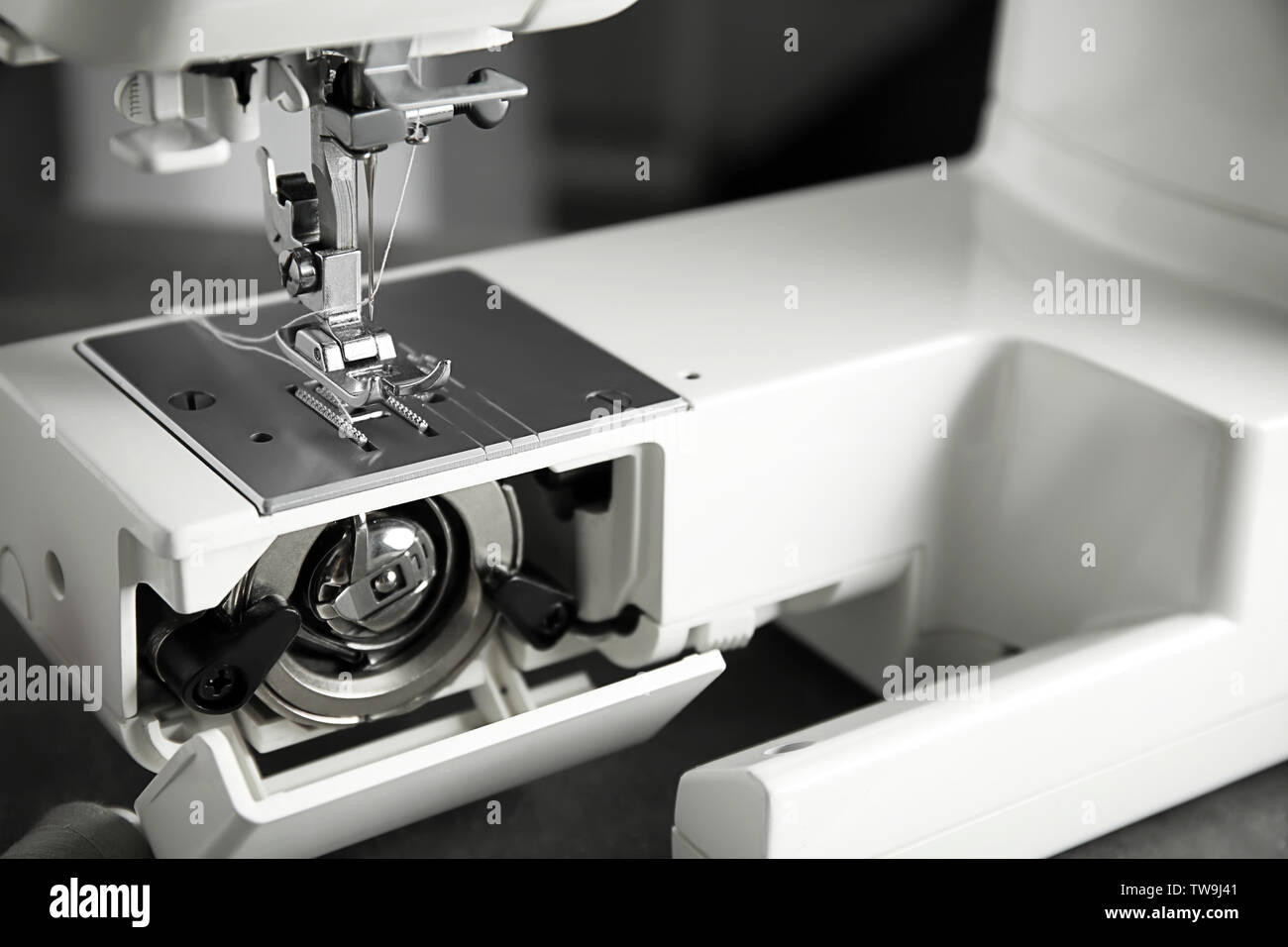 Sewing machine bobbin case hi-res stock photography and images - Alamy