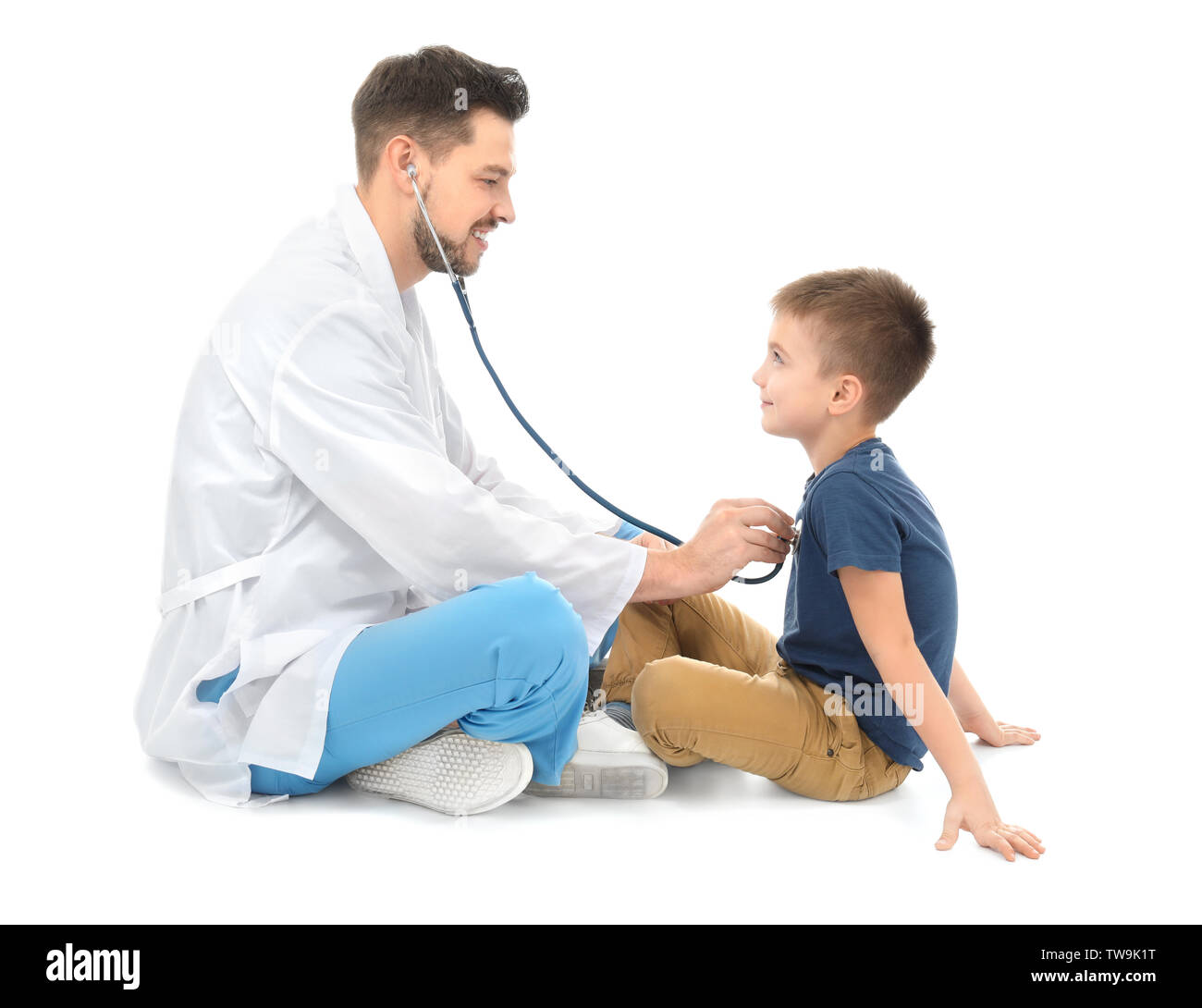 Children's doctor with little boy on white background Stock Photo - Alamy