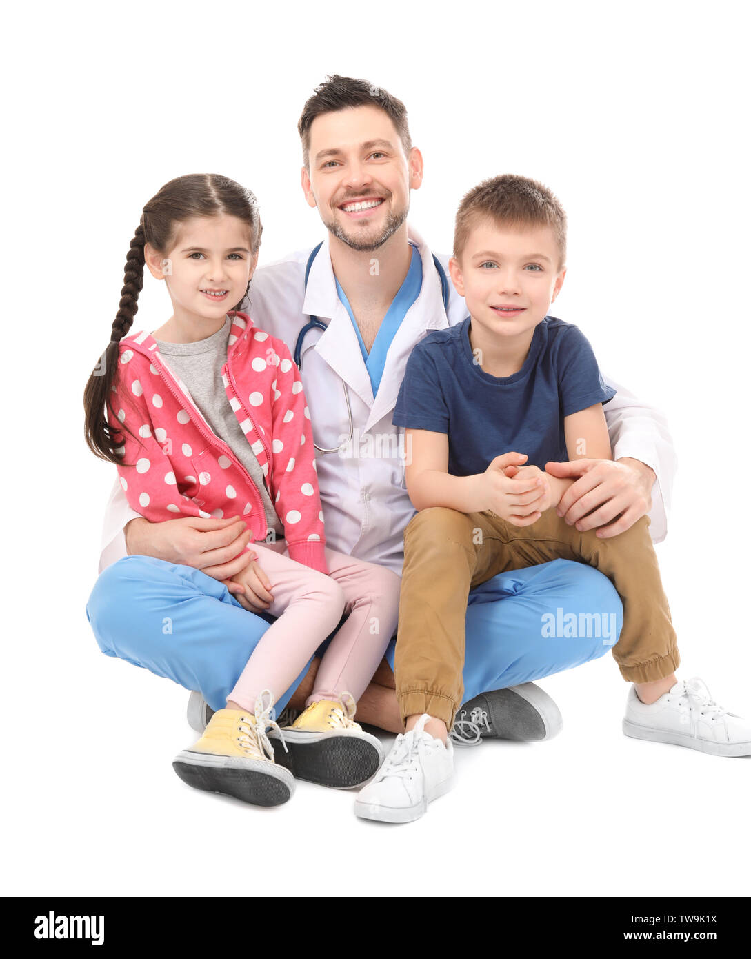 Children's doctor with little kids on white background Stock Photo - Alamy