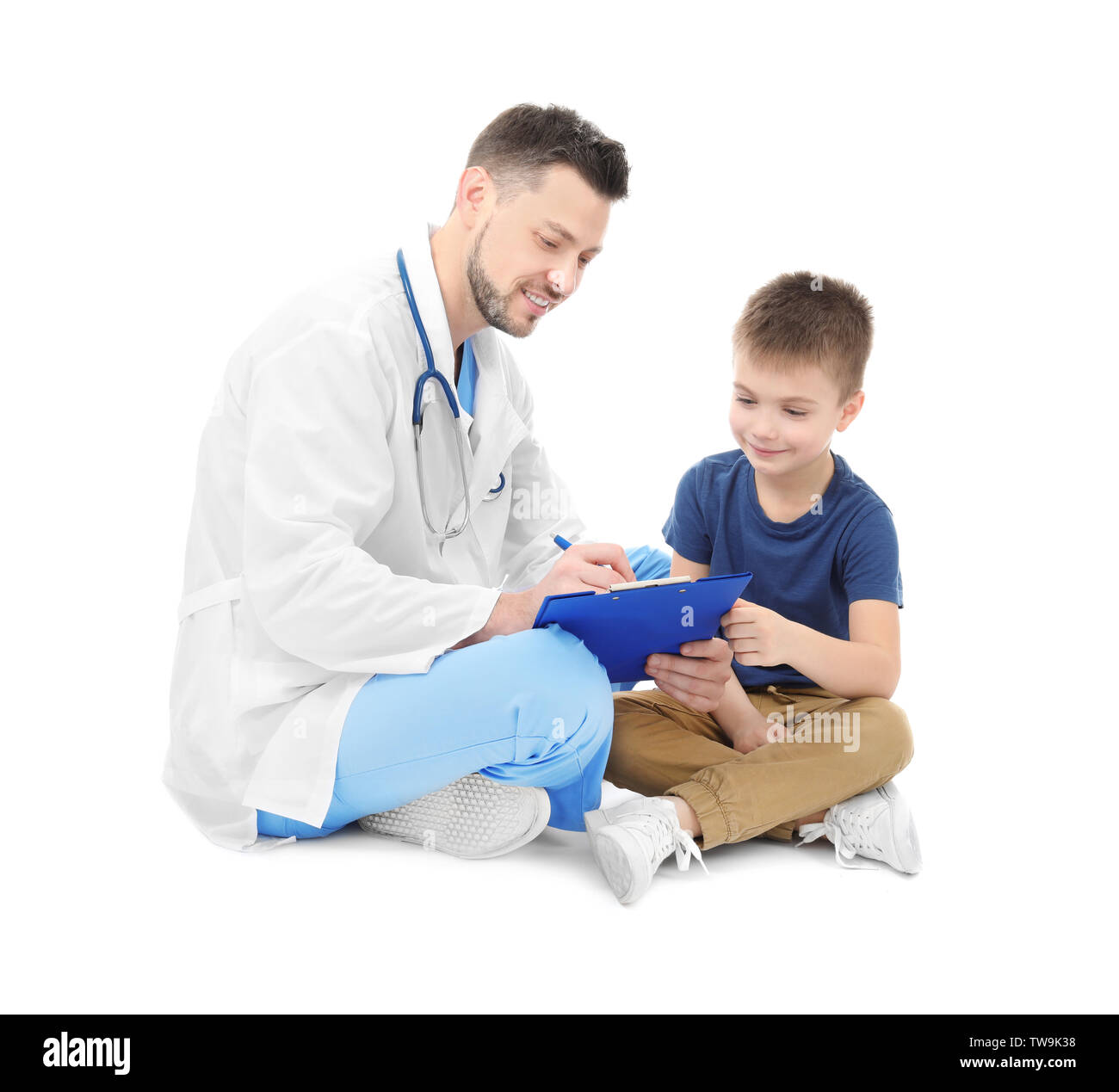 Children's doctor with little boy on white background Stock Photo - Alamy