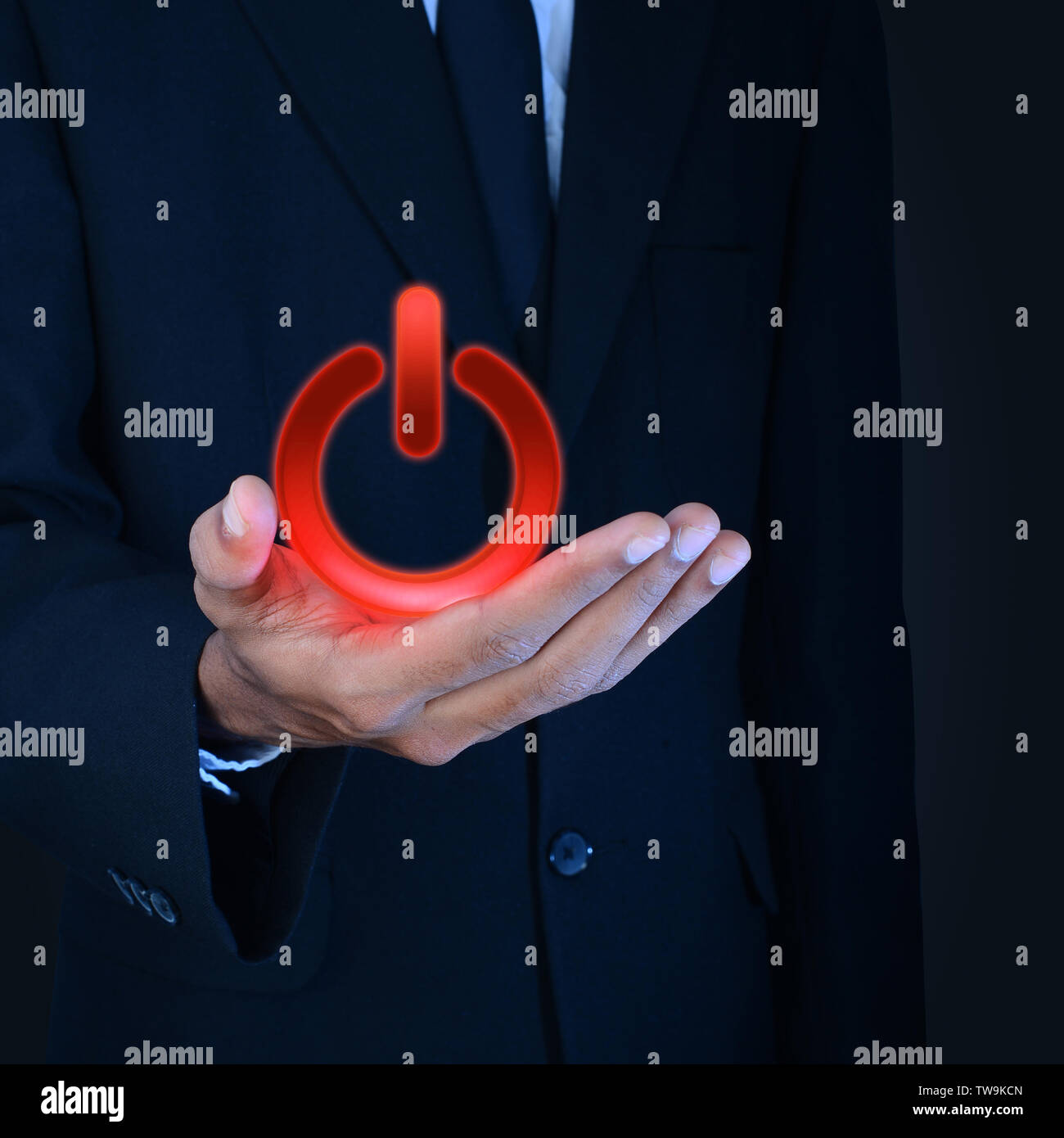 Man showing the power button Stock Photo - Alamy