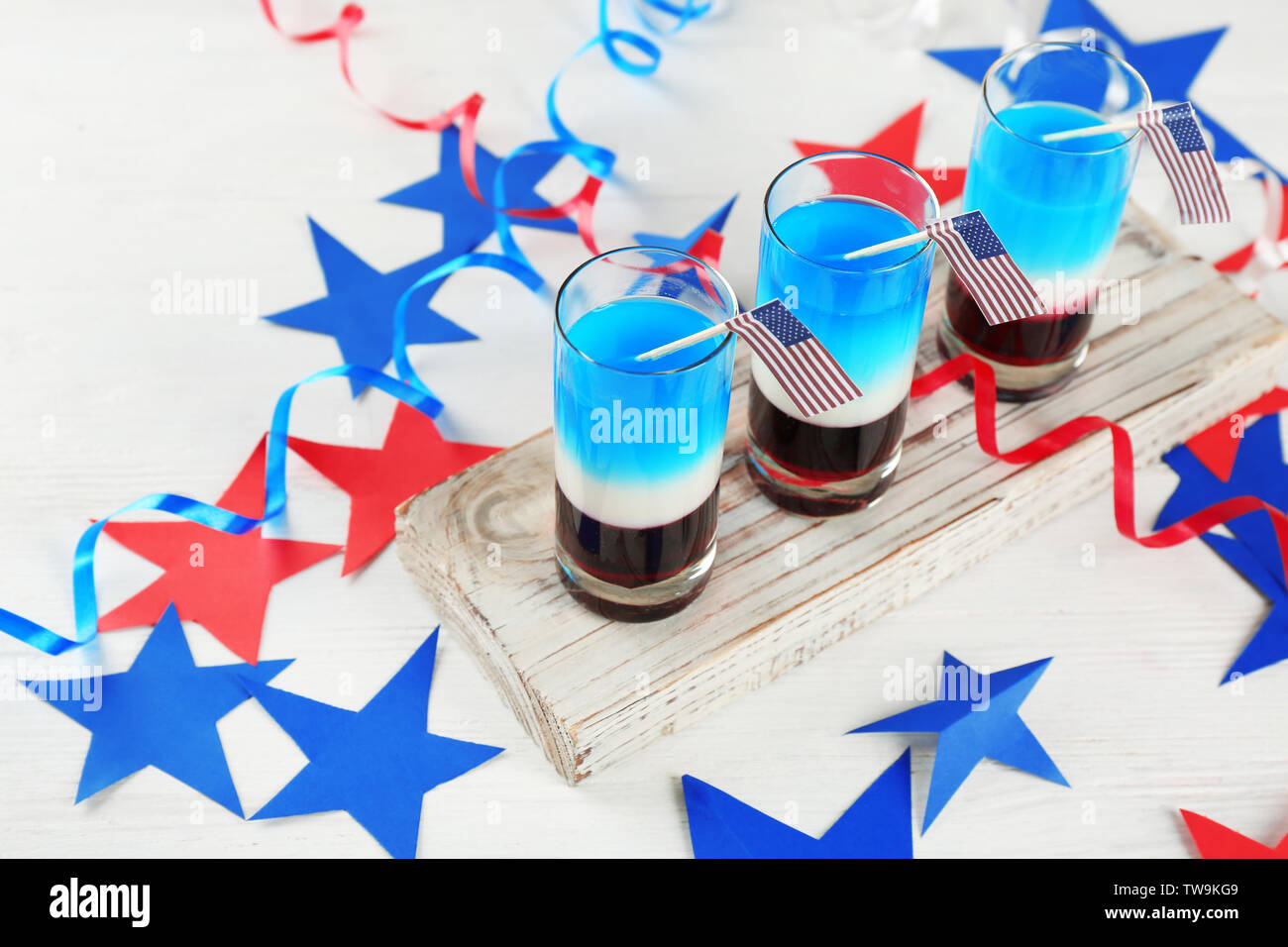 Layered cocktails in colors of American flag on wooden board Stock ...