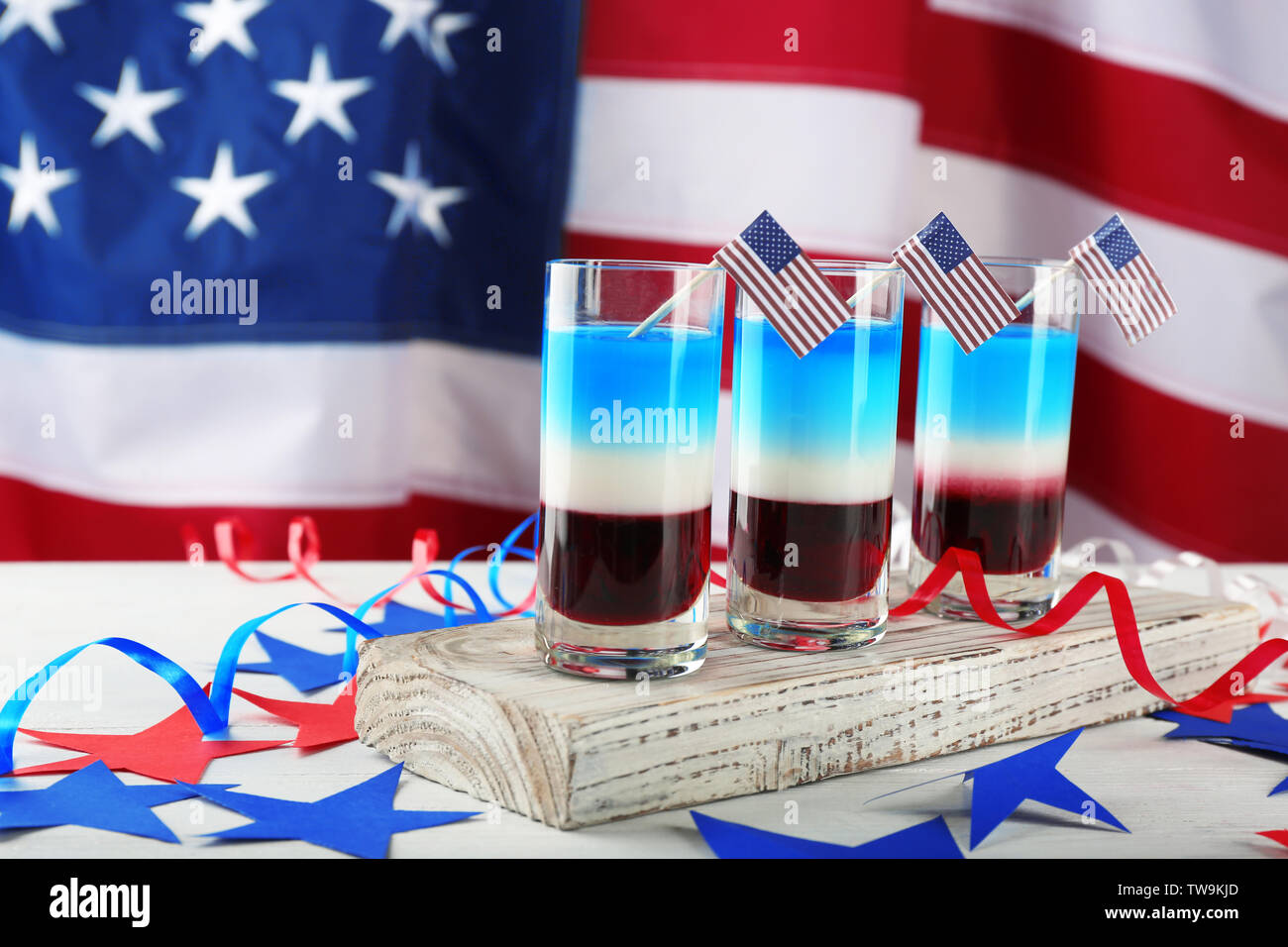 Layered cocktails in colors of American flag on wooden board Stock ...
