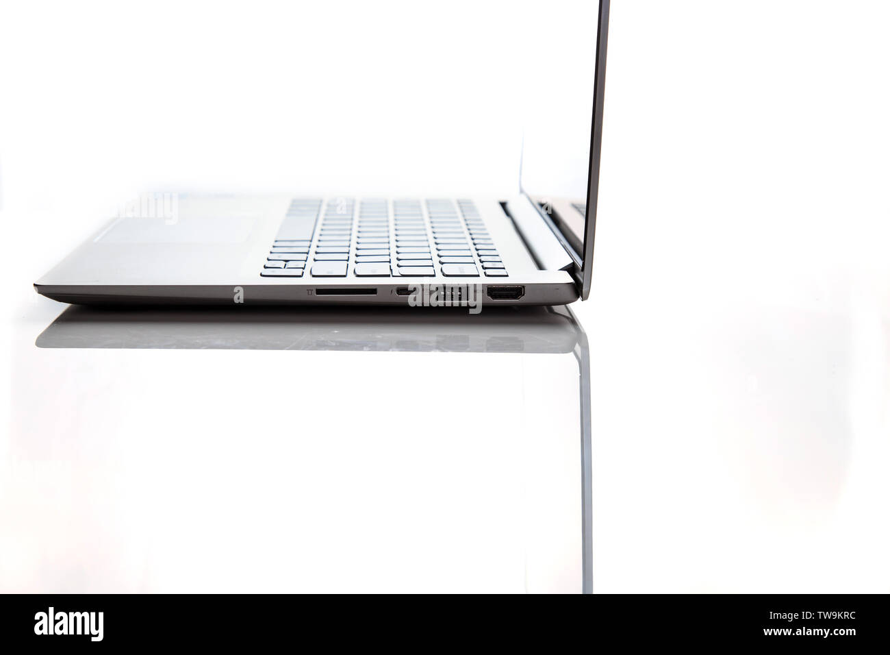 Laptop in white background Stock Photo - Alamy