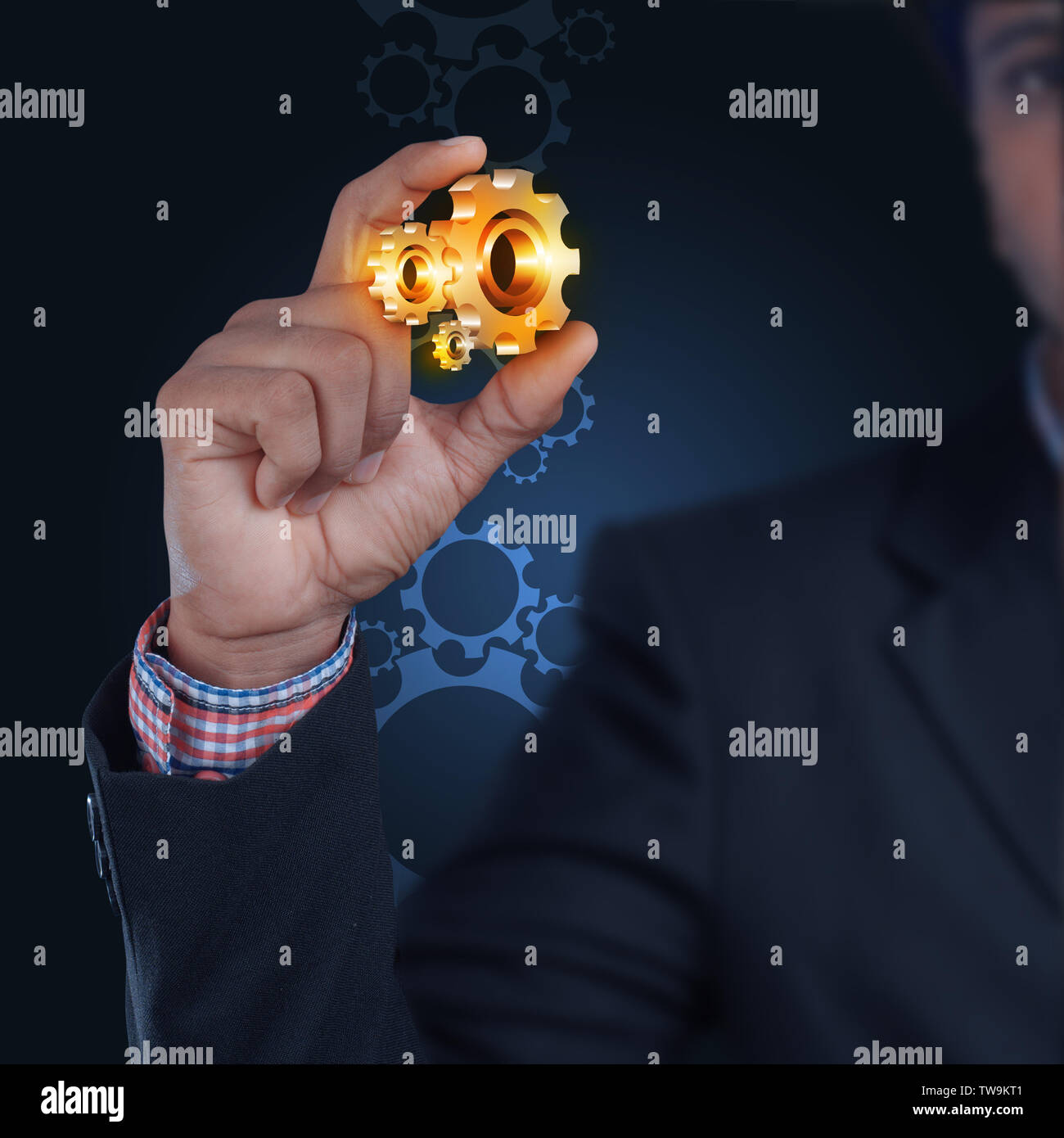 businessman showing gears cogs to success concept Stock Photo - Alamy