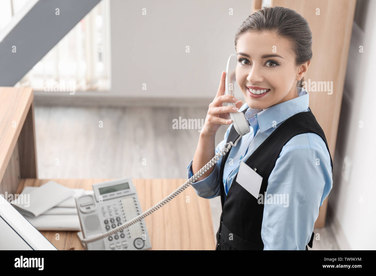 Resort reception on call hi-res stock photography and images - Alamy