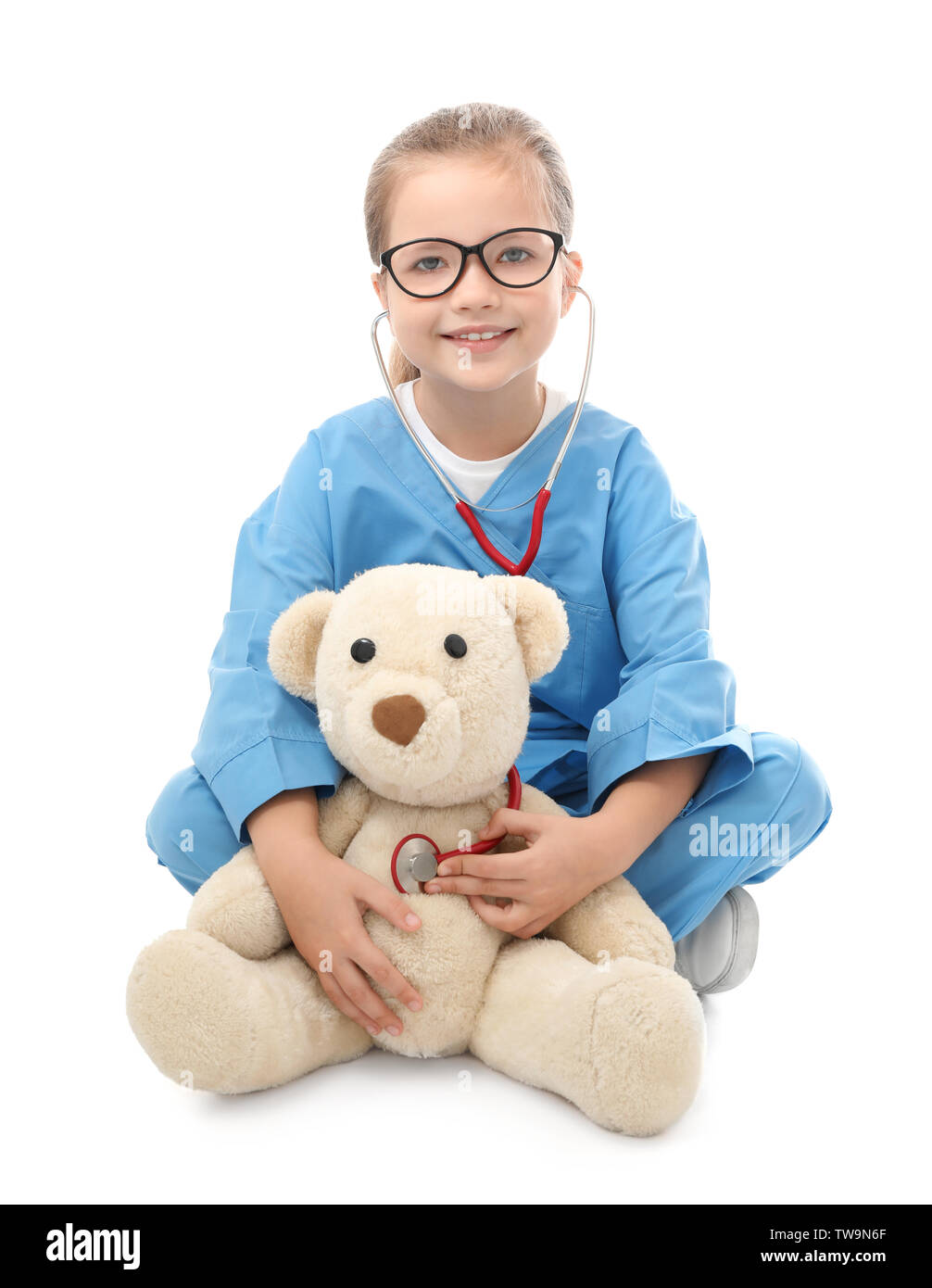 Little girl playing doctor Cut Out Stock Images & Pictures - Alamy