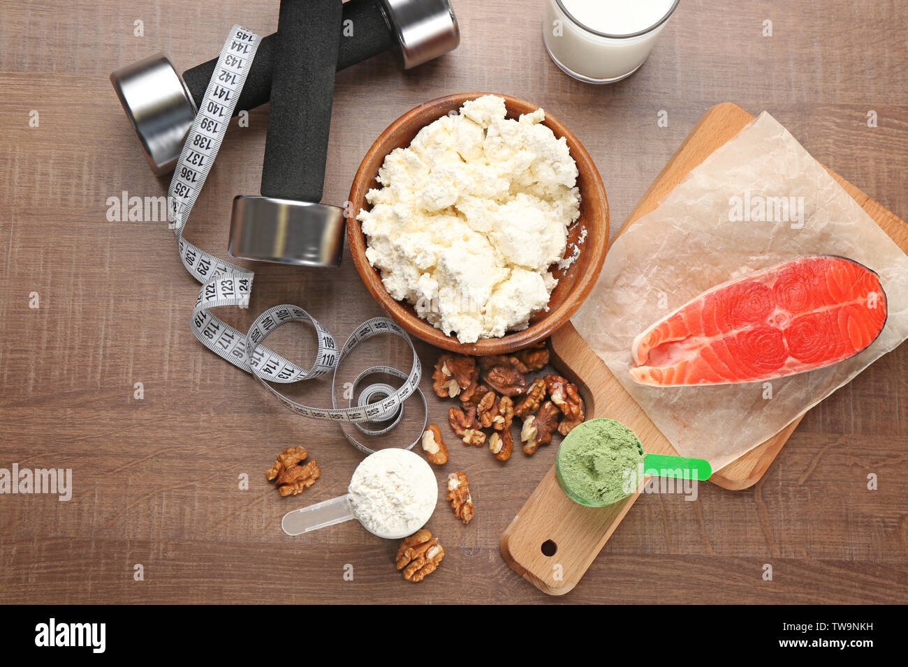 High protein food and different powders on table Stock Photo - Alamy