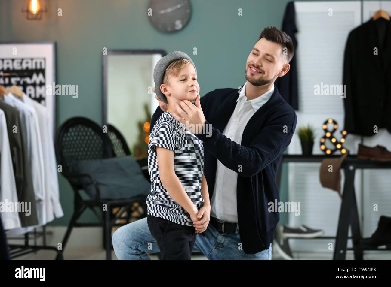 Stylish father and son, indoors Stock Photo - Alamy