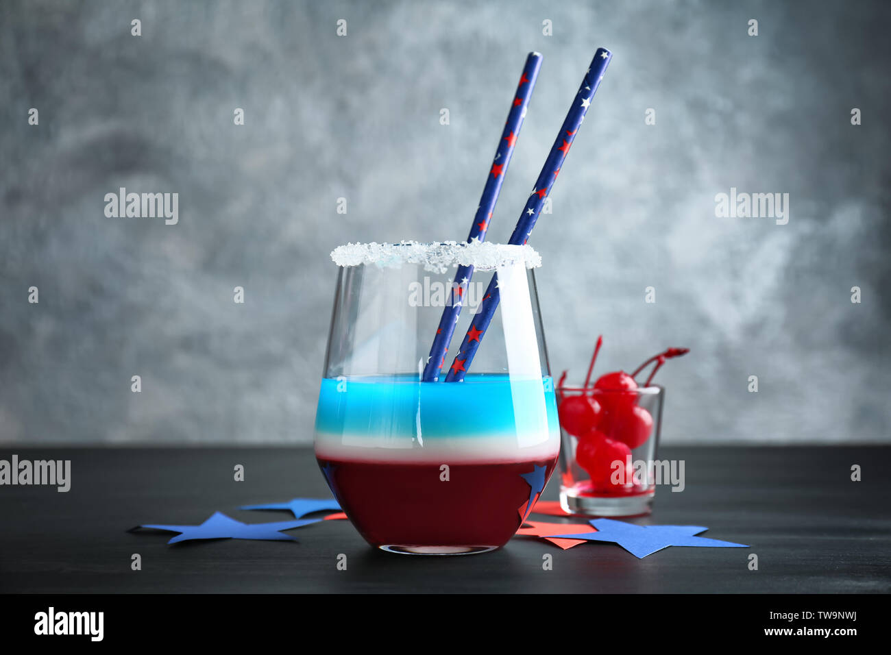 Layered cocktail in colors of American flag on table Stock Photo - Alamy