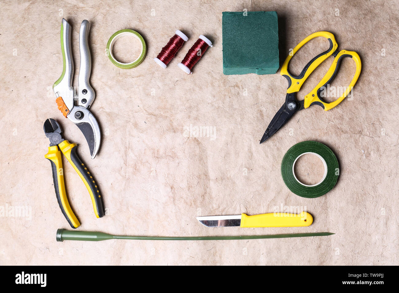 Florist equipment on paper background Stock Photo - Alamy