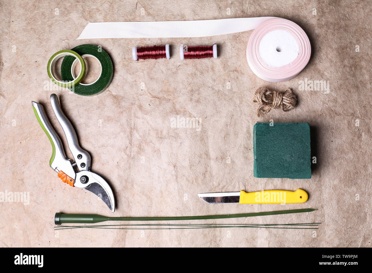 Florist equipment on paper background Stock Photo - Alamy
