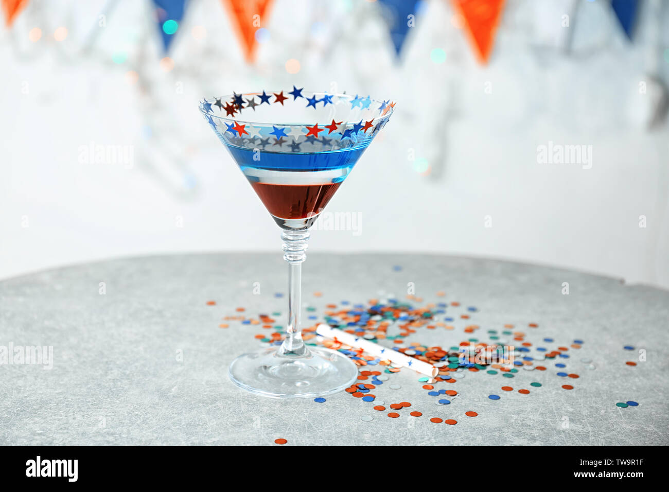 Layered cocktail in colors of American flag on table Stock Photo - Alamy