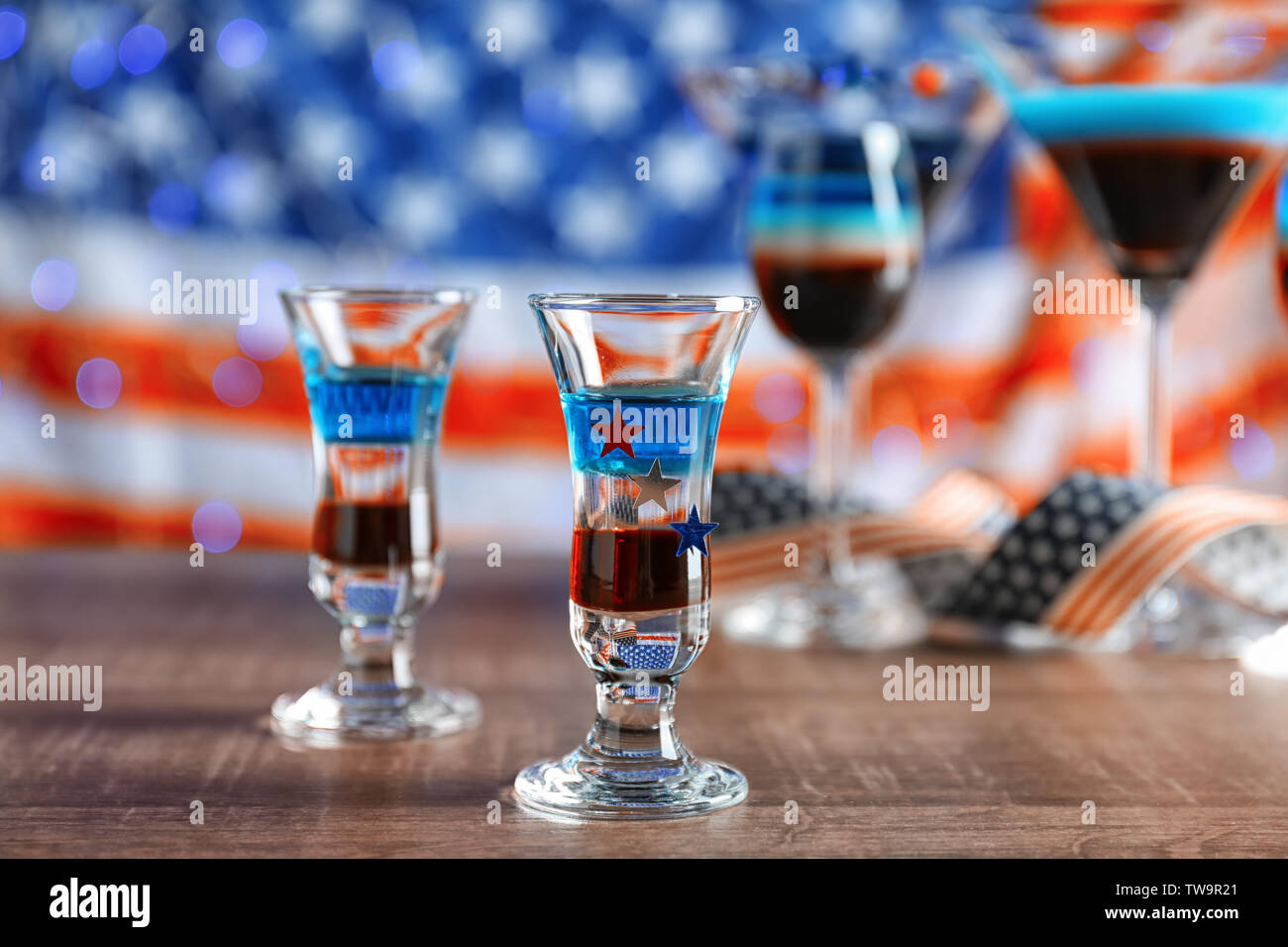 Layered cocktails in colors of American flag on table Stock Photo - Alamy