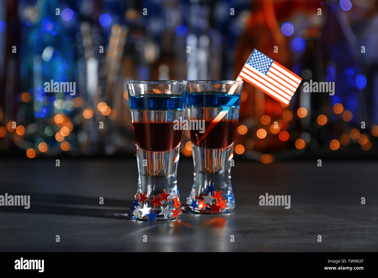Layered cocktails in colors of American flag on table Stock Photo - Alamy