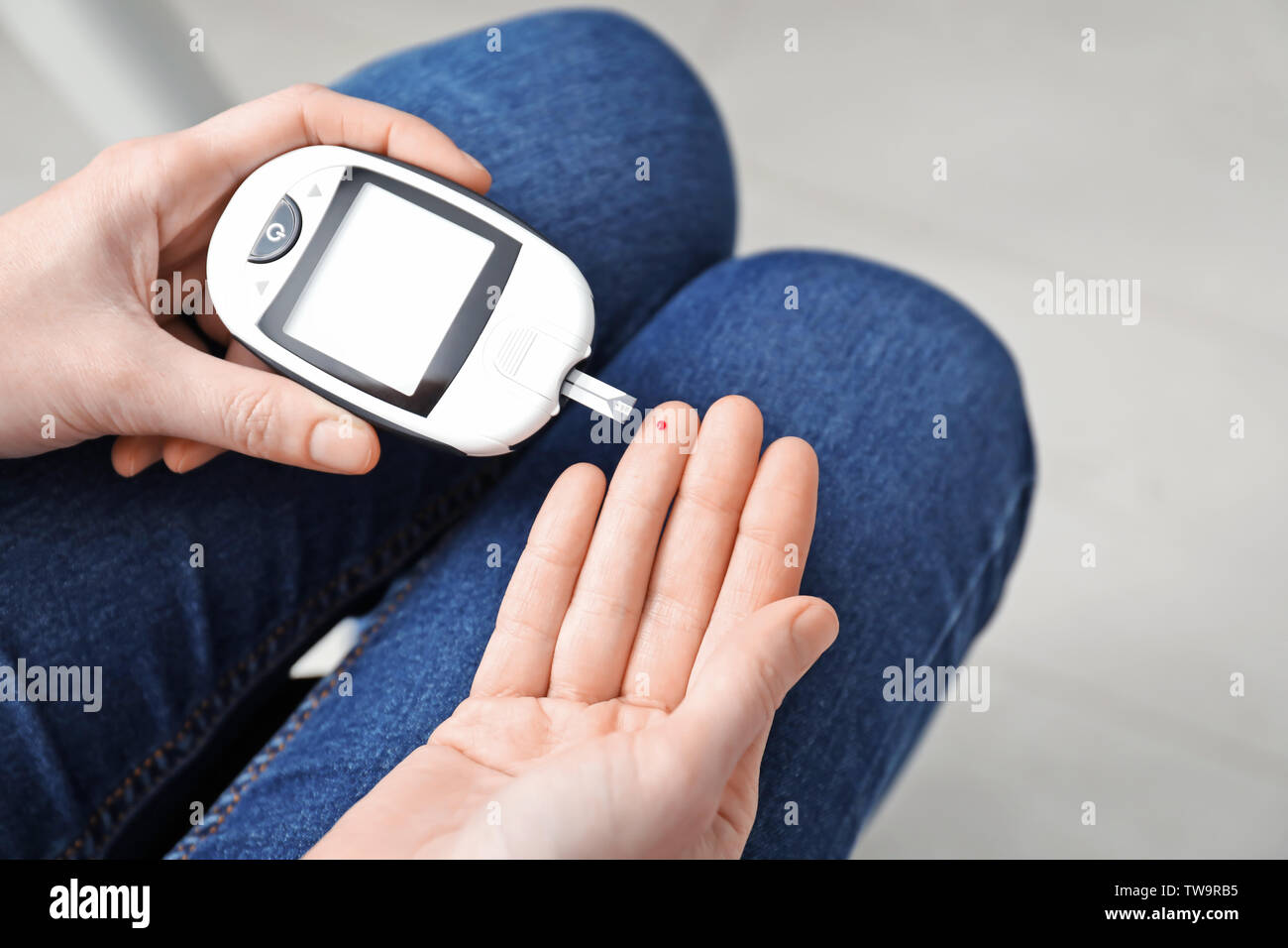 Using glucometer hi-res stock photography and images - Alamy