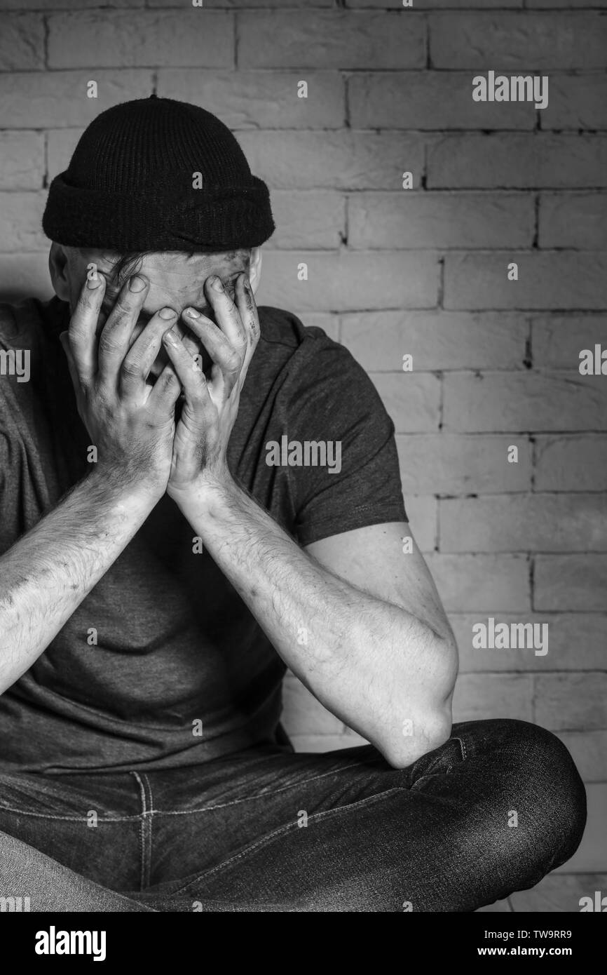 Homeless man crying help hi-res stock photography and images - Alamy