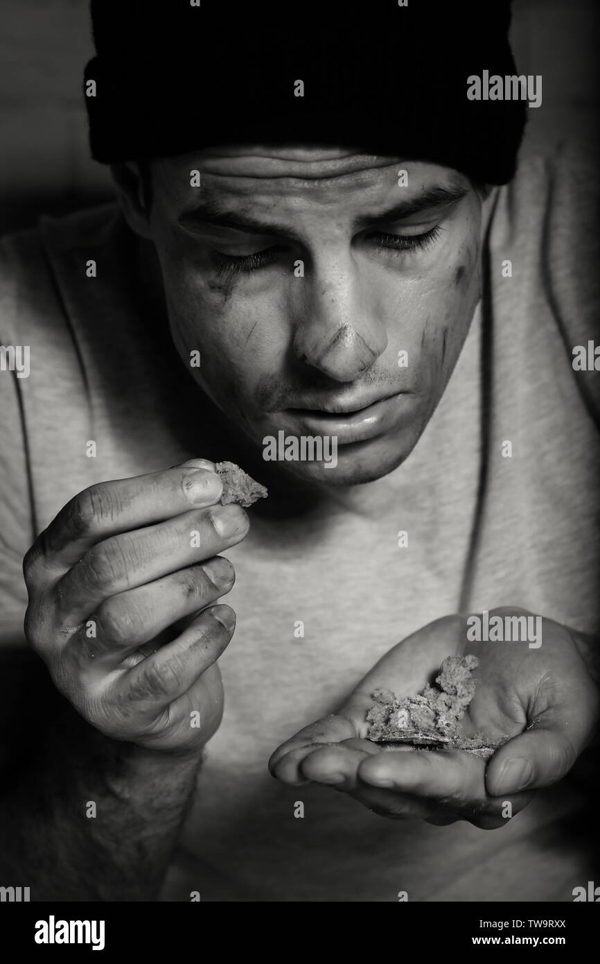 Poor man eating hi-res stock photography and images - Alamy