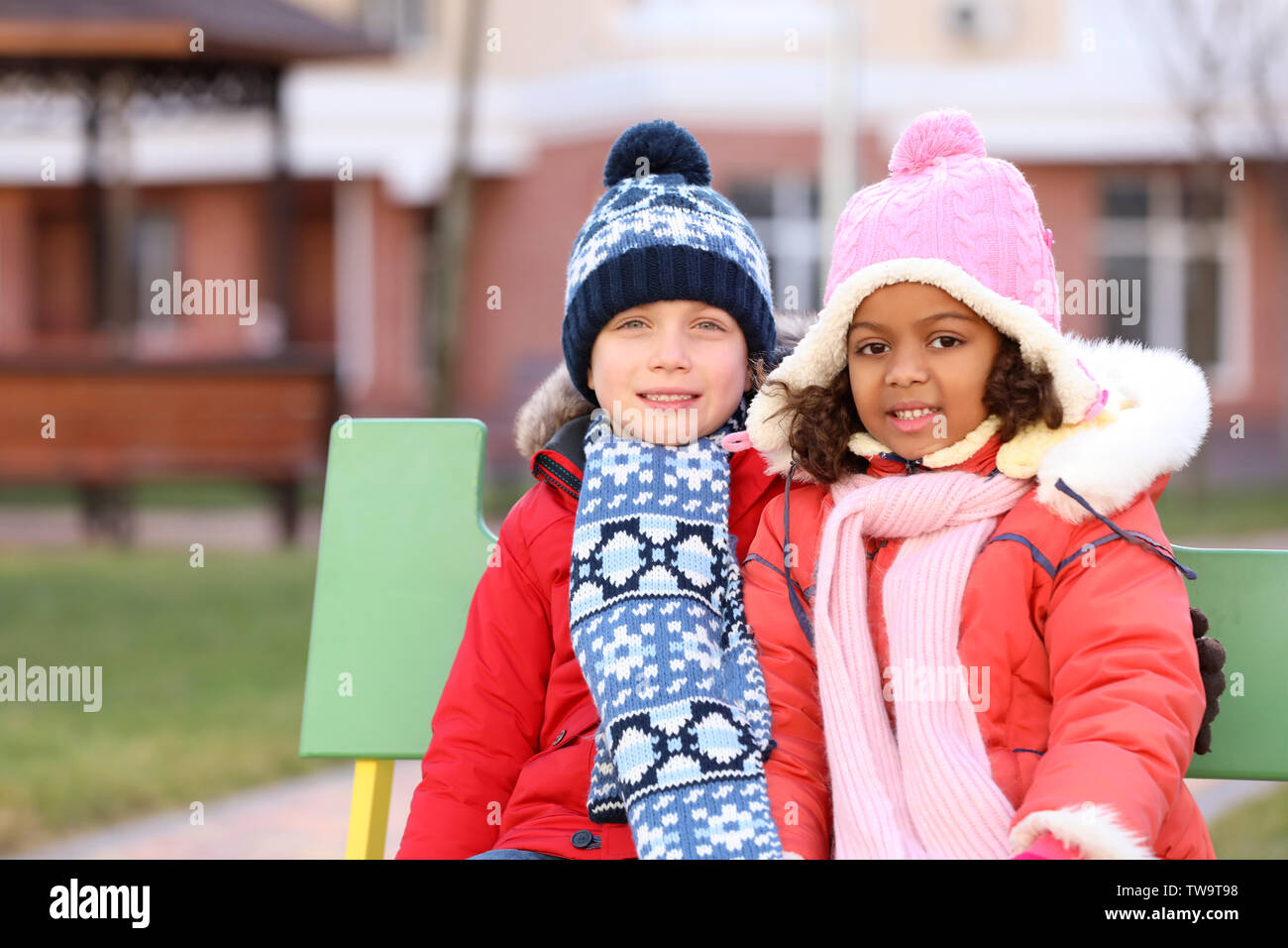 Cute little kids outdoors. Child adoption Stock Photo - Alamy