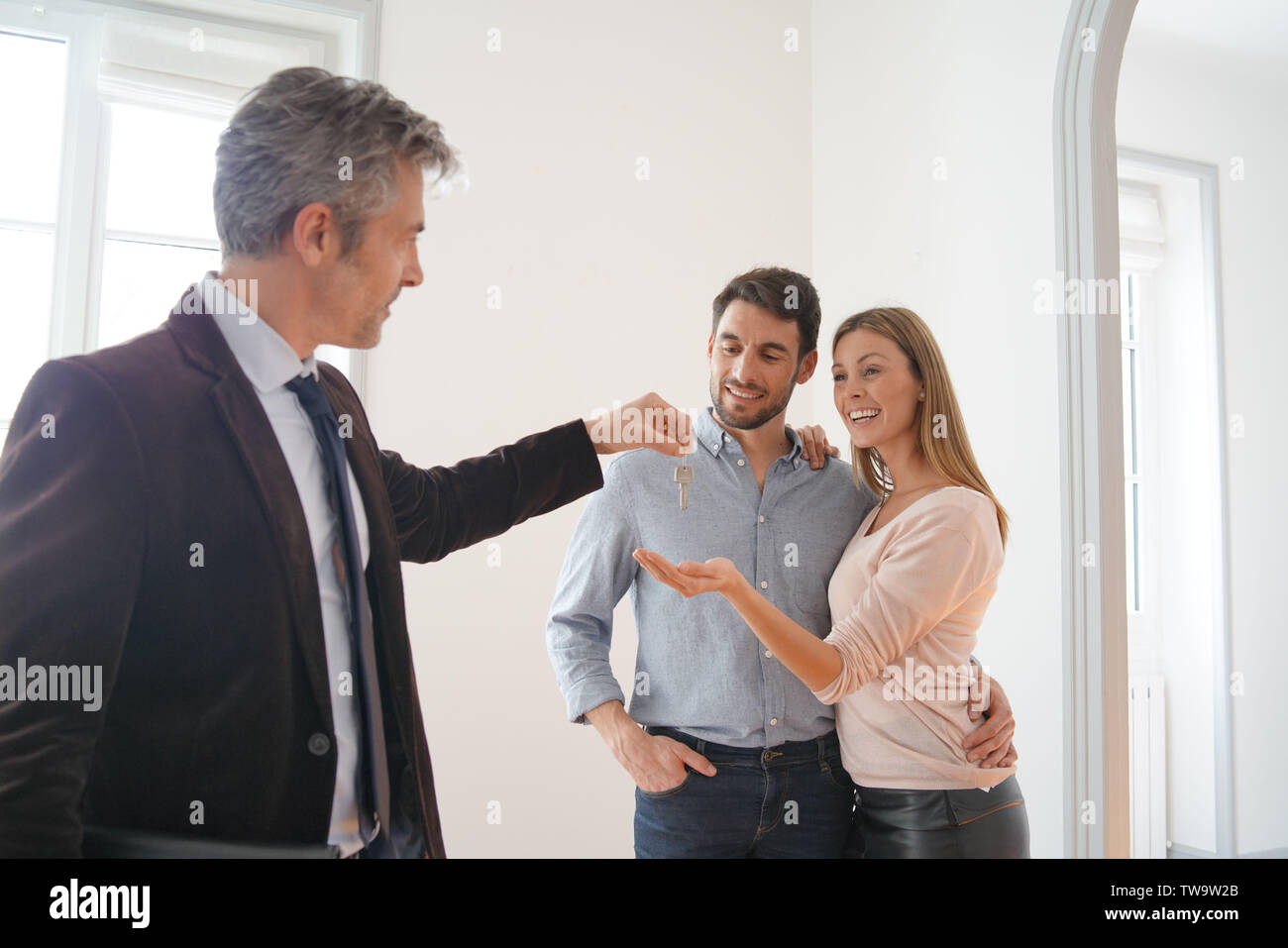 Handing over keys hi-res stock photography and images - Alamy