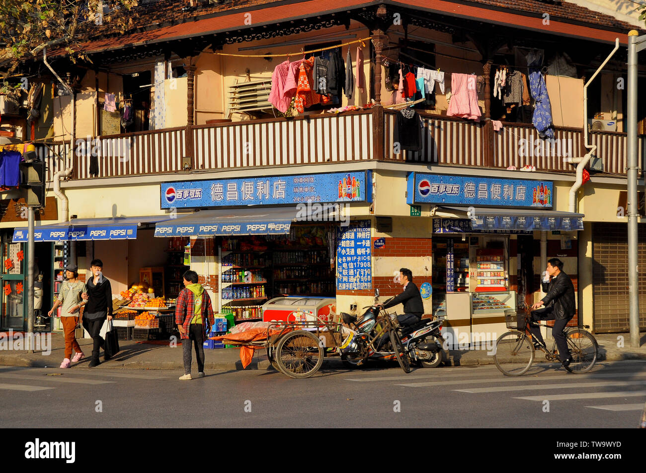 corner shop street scene Shanghai China Stock Photo - Alamy