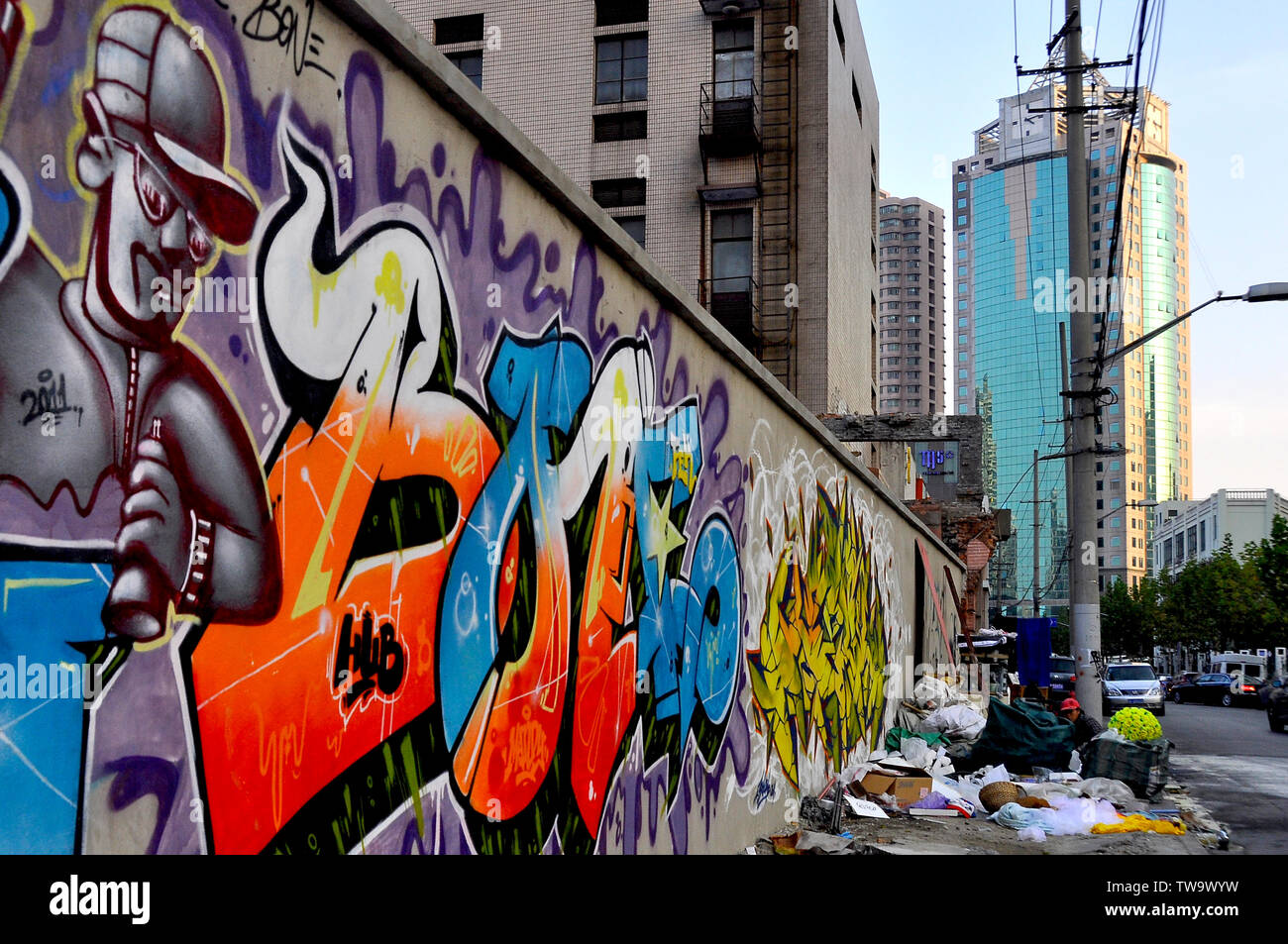Graffiti on a wall in back street of Shanghai Stock Photo - Alamy