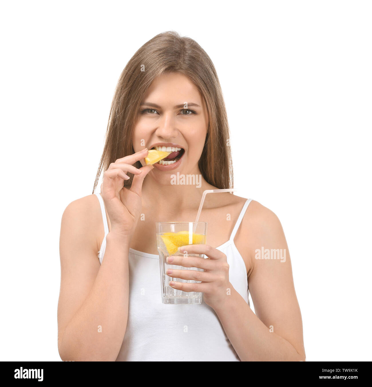 Beautiful young woman with glass of lemonade on white background Stock ...