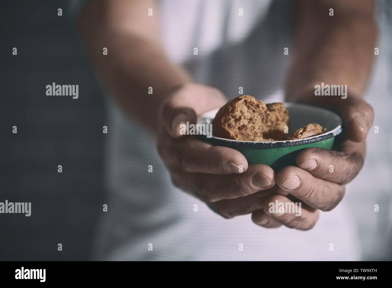 Hungry poor man holding hi-res stock photography and images - Alamy