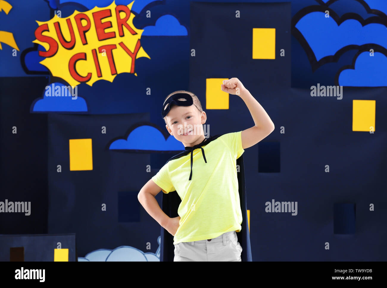 Cute boy as superhero against decoration. Comic strip city theme Stock ...