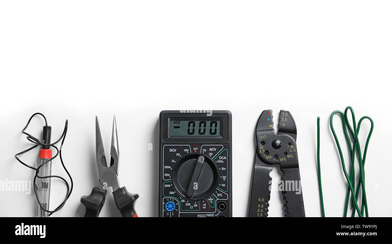 Different electrical tools on white background Stock Photo - Alamy
